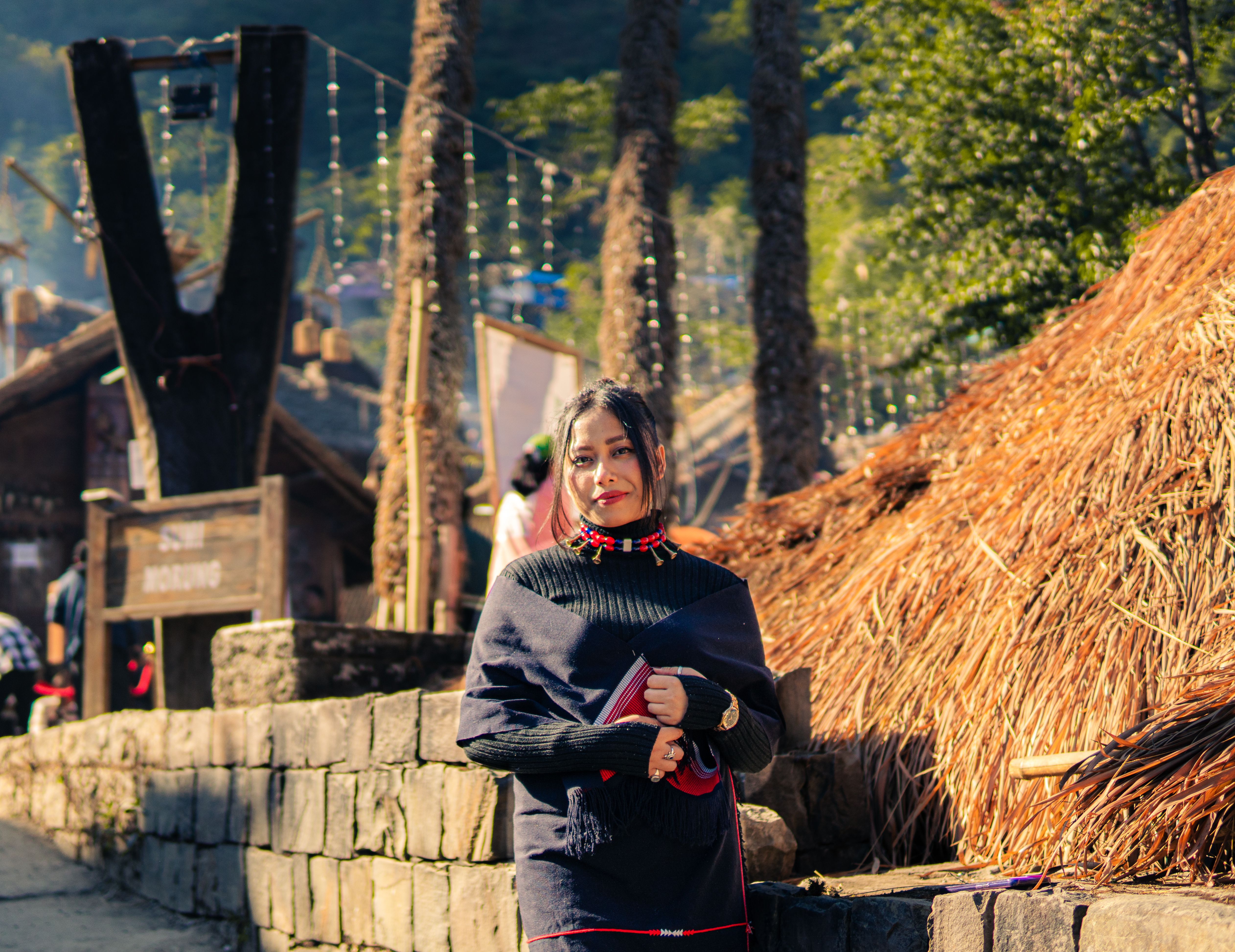Outdoor Portrait of Woman at Rustic Village Setting · Free Stock Photo