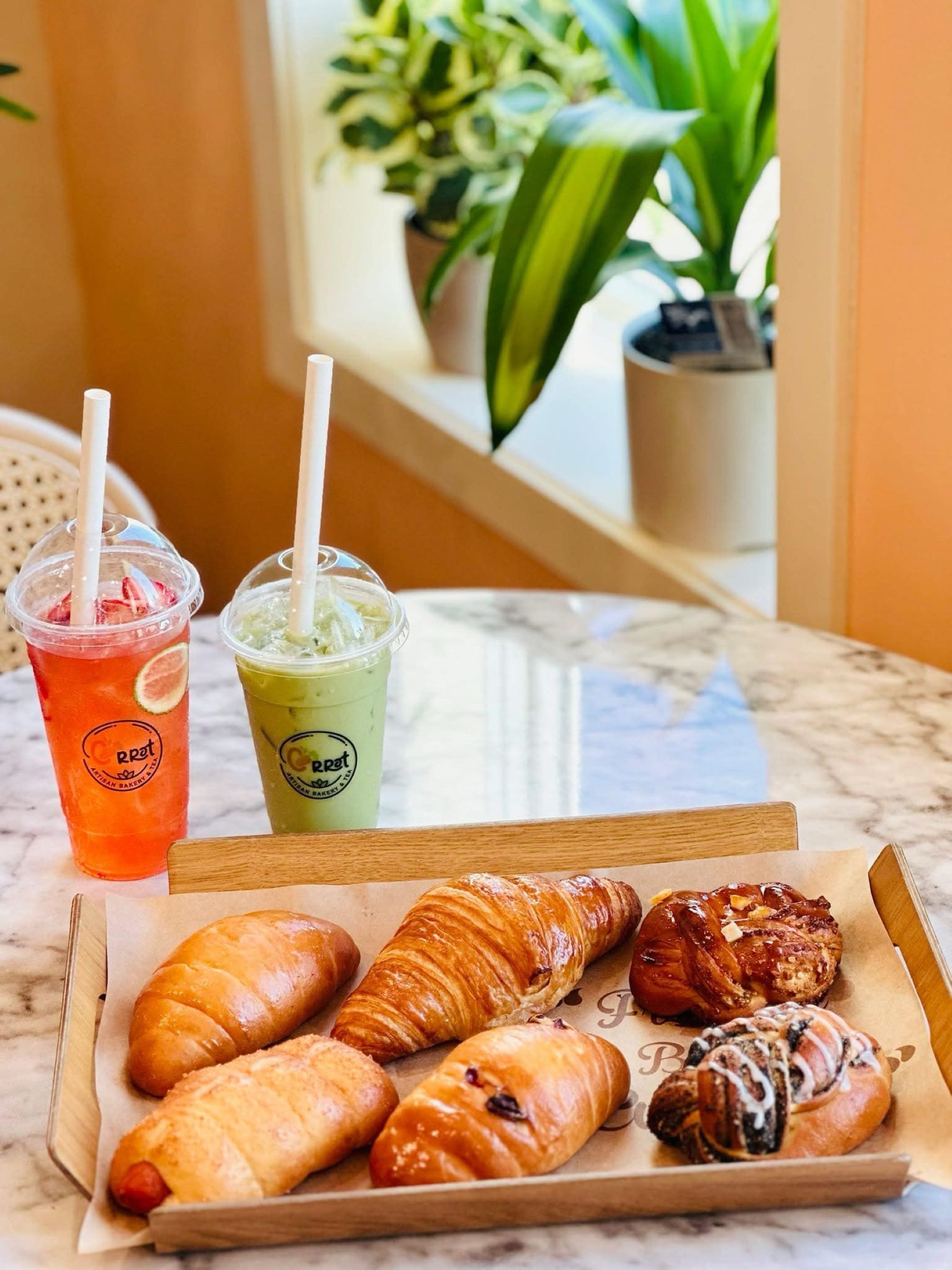 Assorted Pastries and Refreshing Drinks in Café · Free Stock Photo