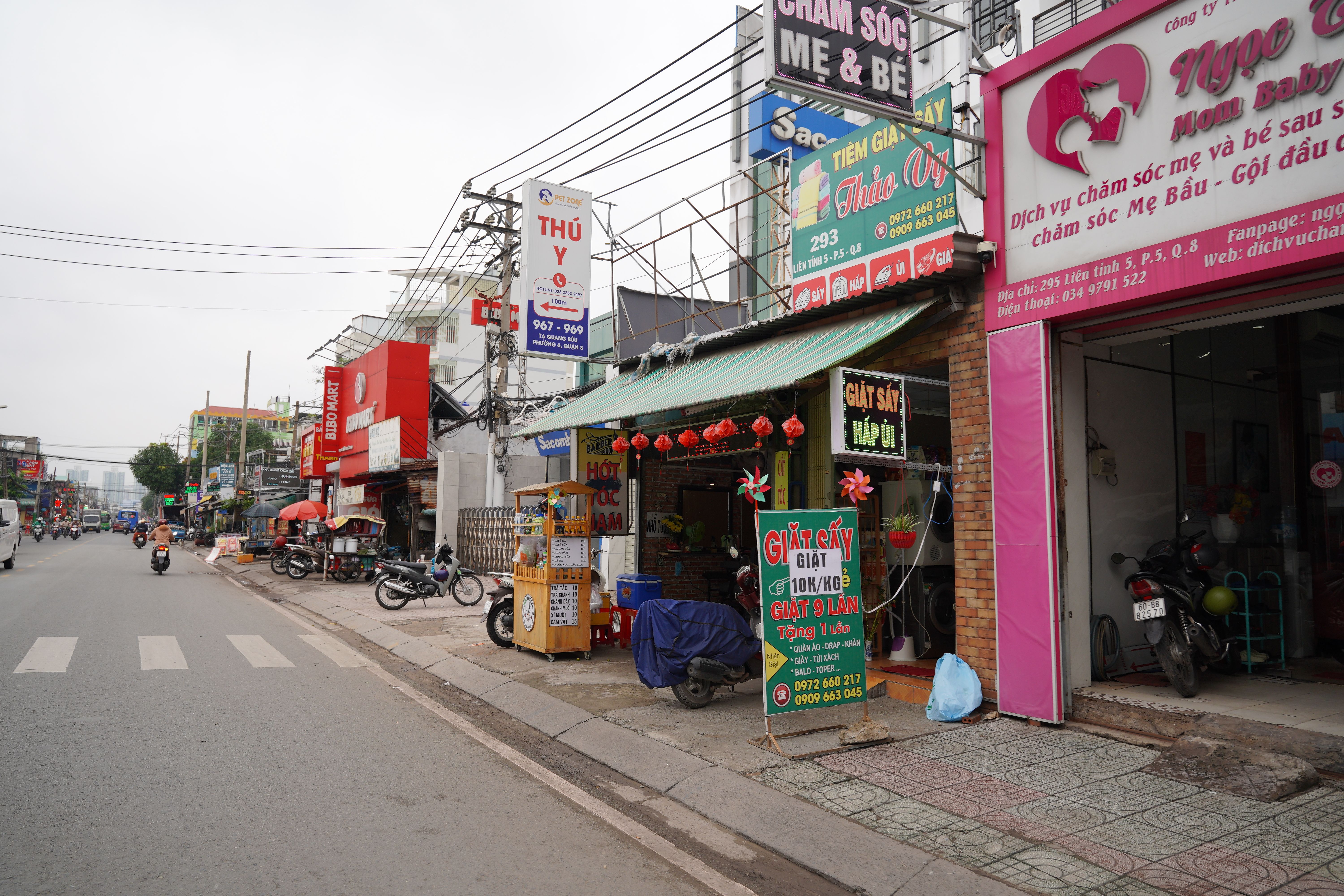 Street View of Local Shops in Urban Setting · Free Stock Photo