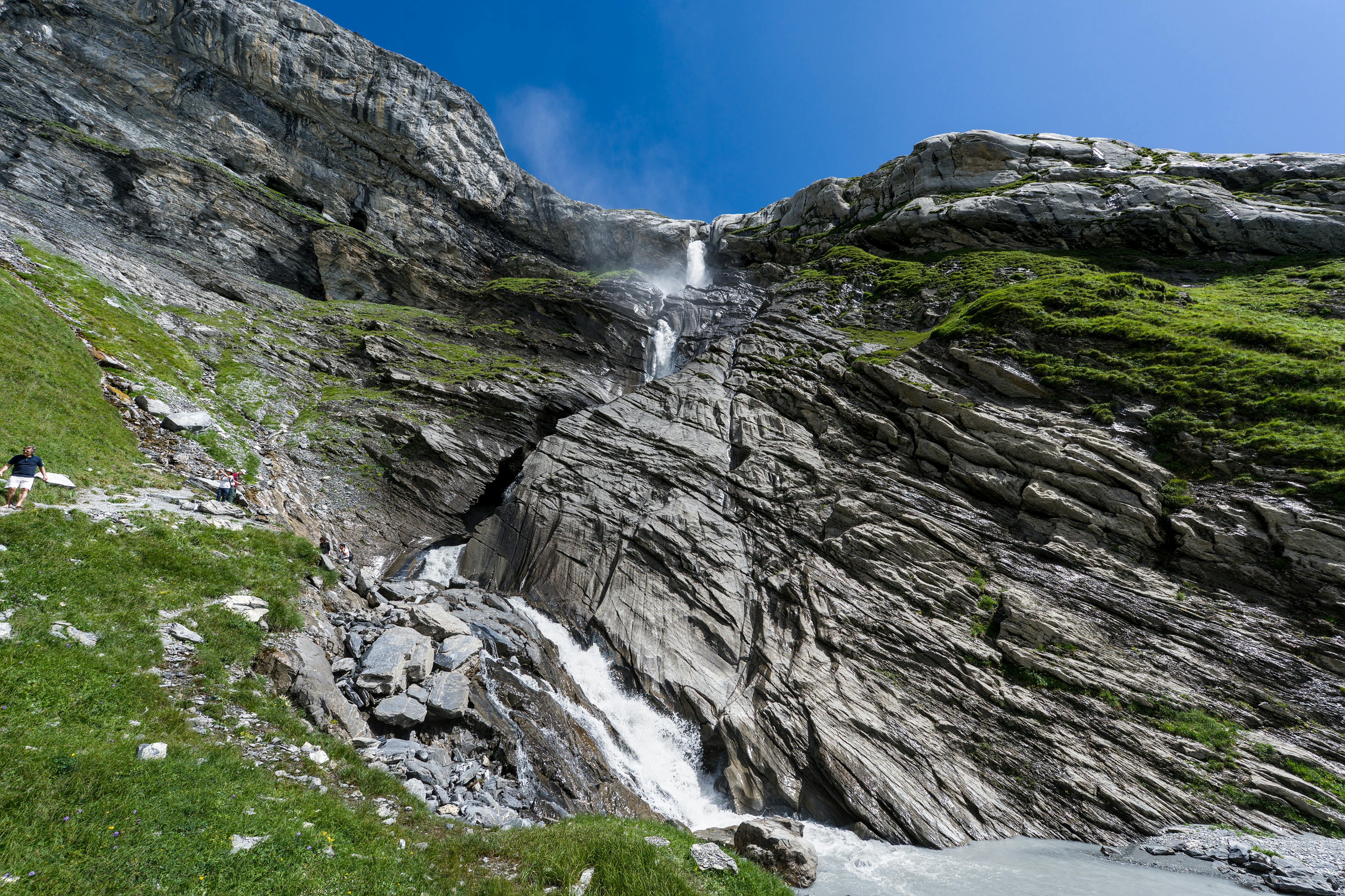 Majestic Waterfall in Swiss Alps Landscape · Free Stock Photo