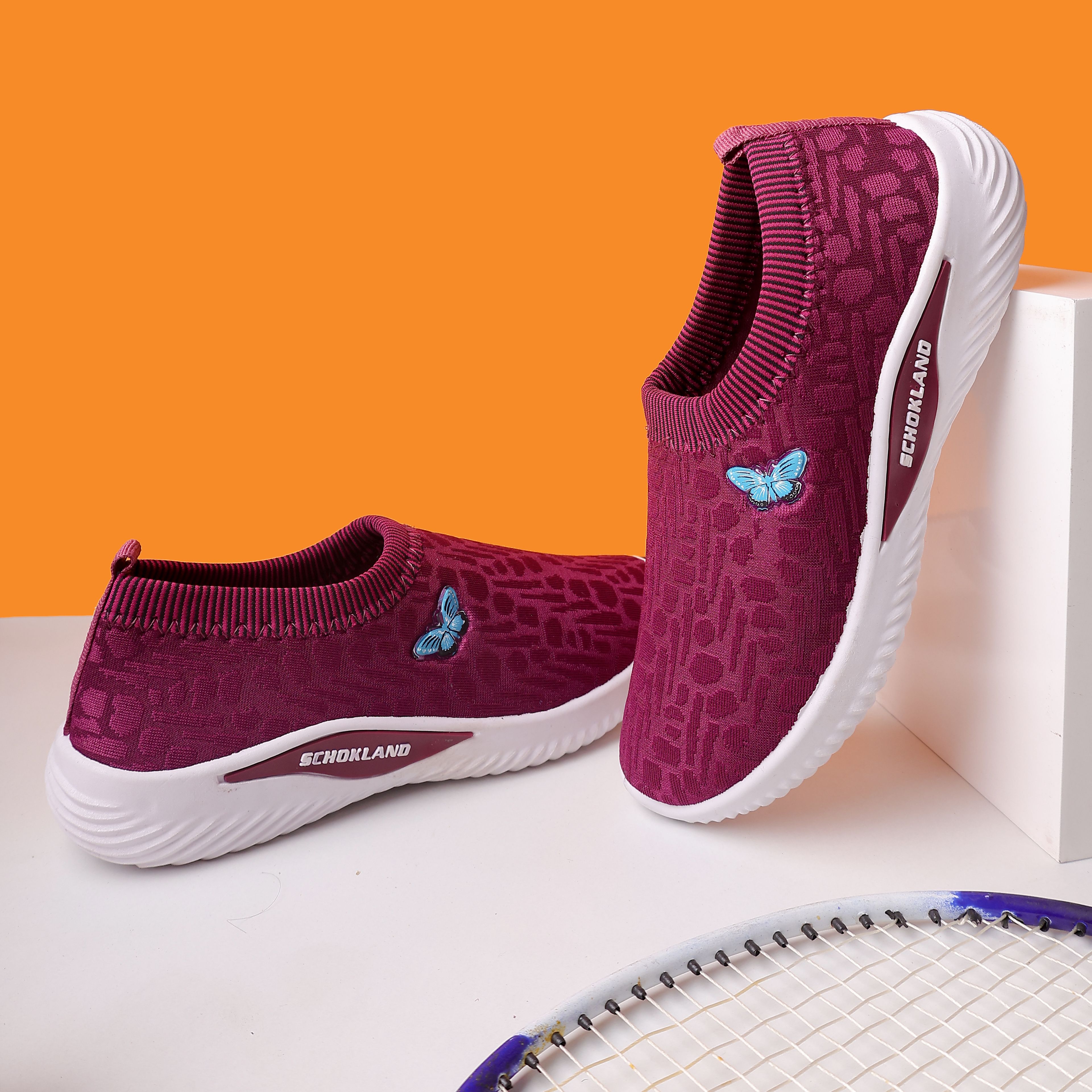 Stylish Women's Shoes with Butterfly Design · Free Stock Photo