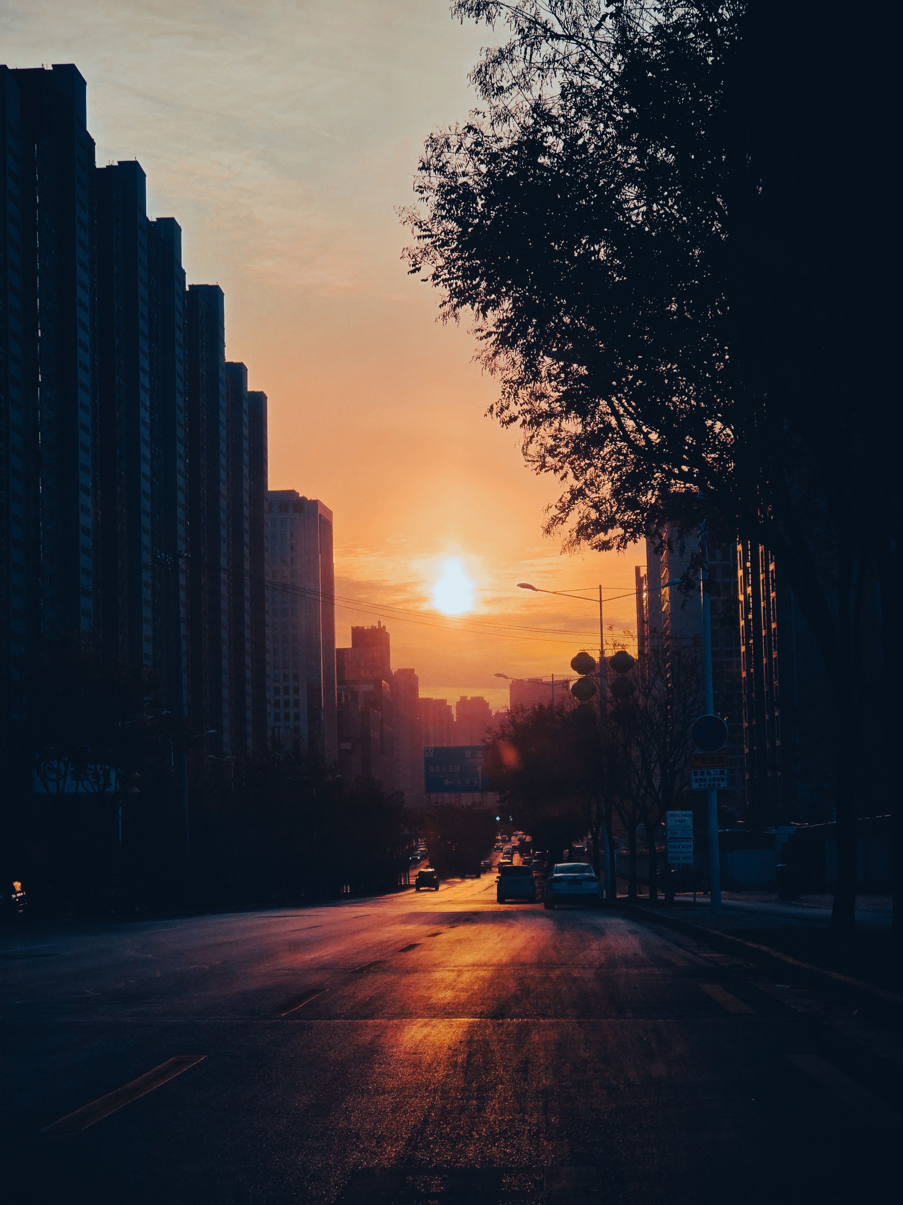 Urban Sunset over City Skyline at Dusk · Free Stock Photo