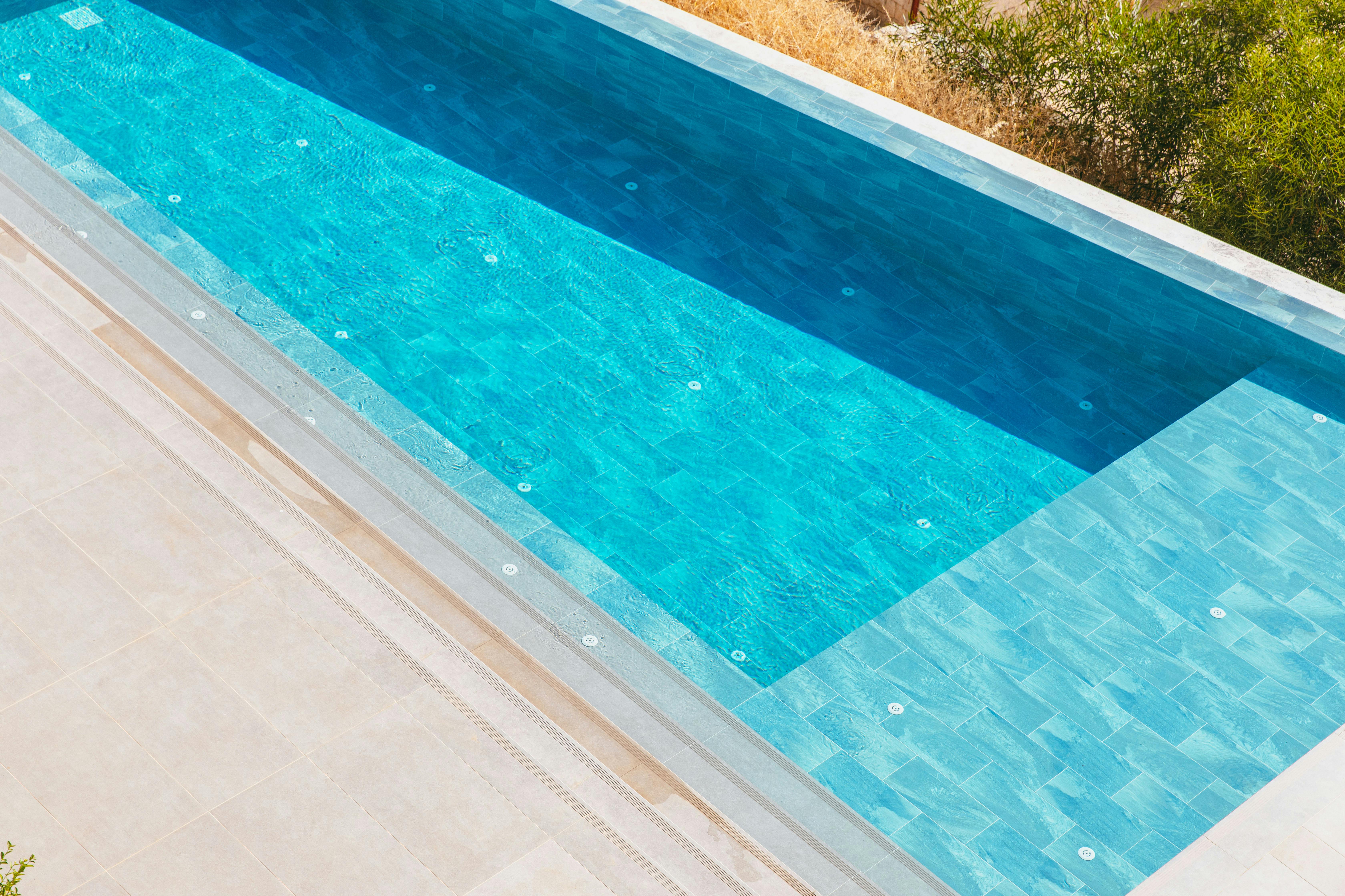 Refreshing Aerial View of Luxury Pool · Free Stock Photo
