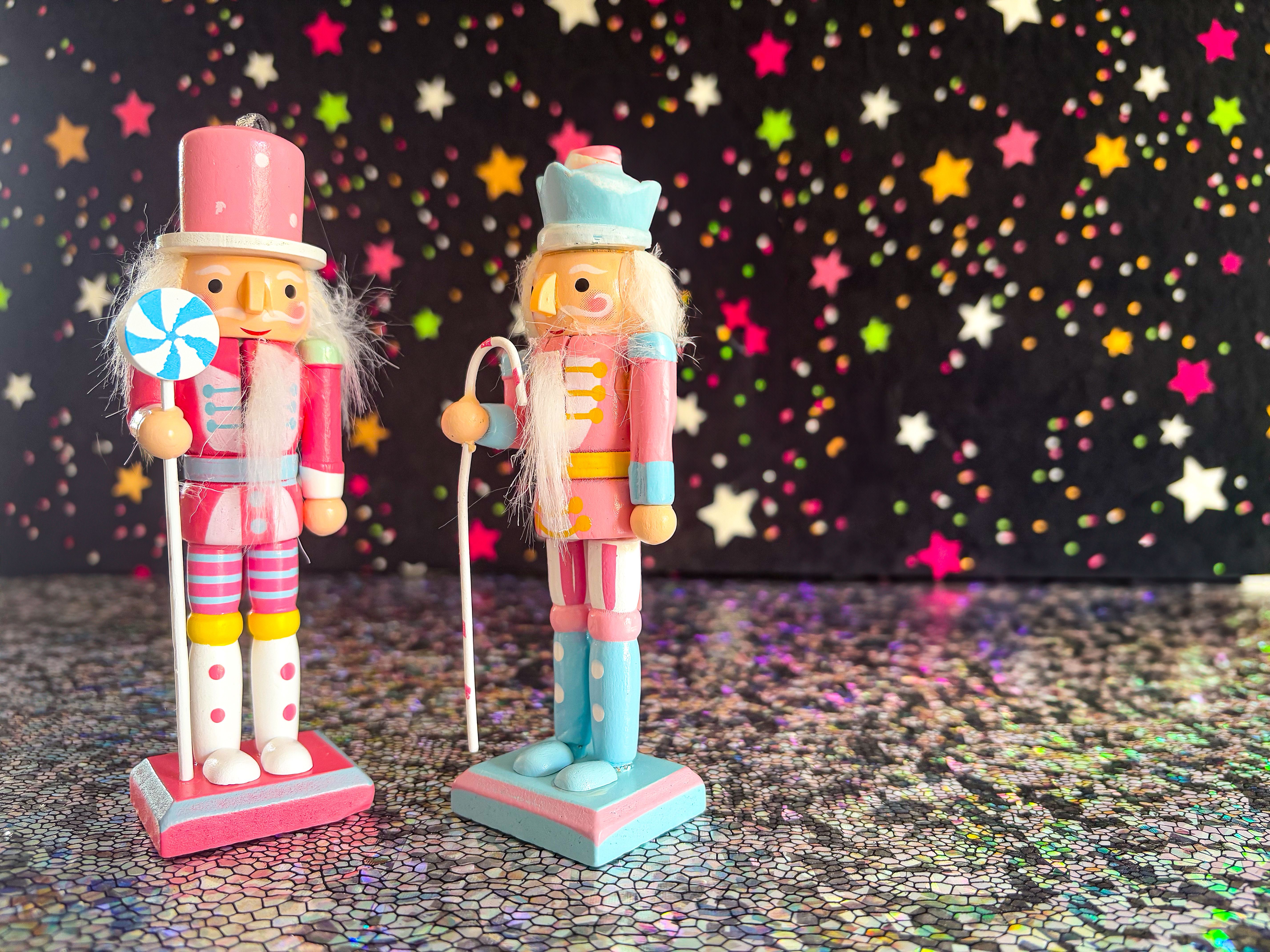 Colorful Nutcracker Figures with Stars Background · Free Stock Photo