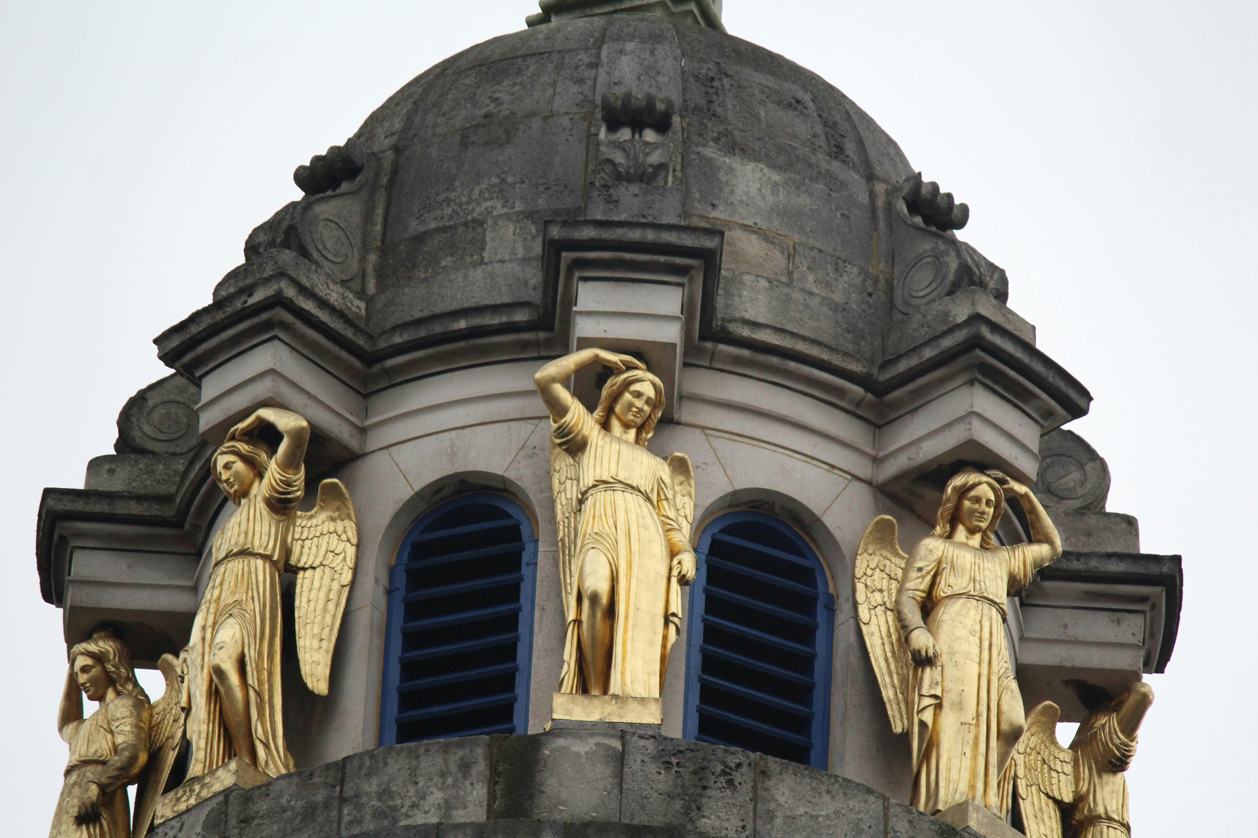 Ornate Angelic Statues on Historic Dome · Free Stock Photo