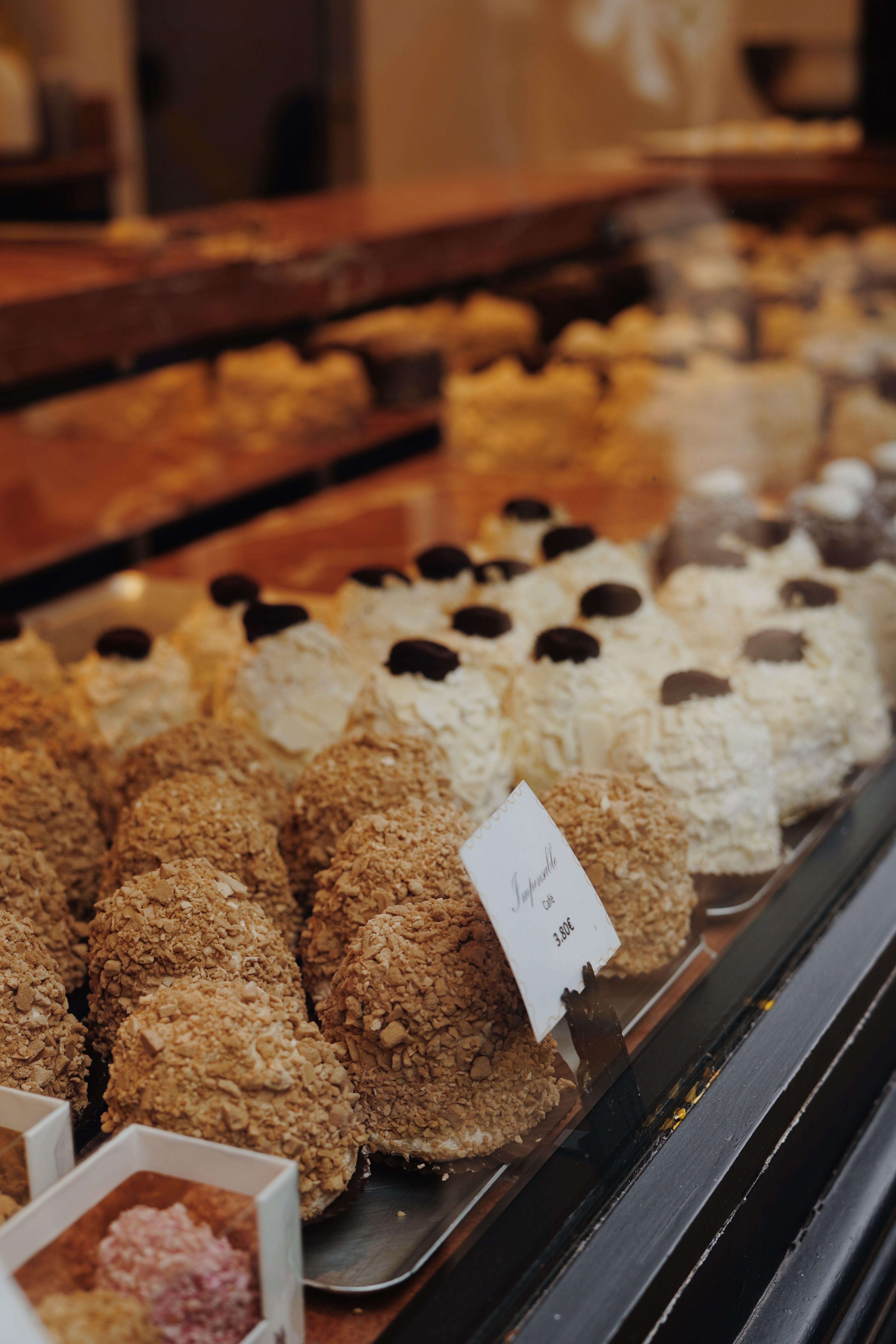 Delicious Assorted Pastries in a Bakery Display · Free Stock Photo