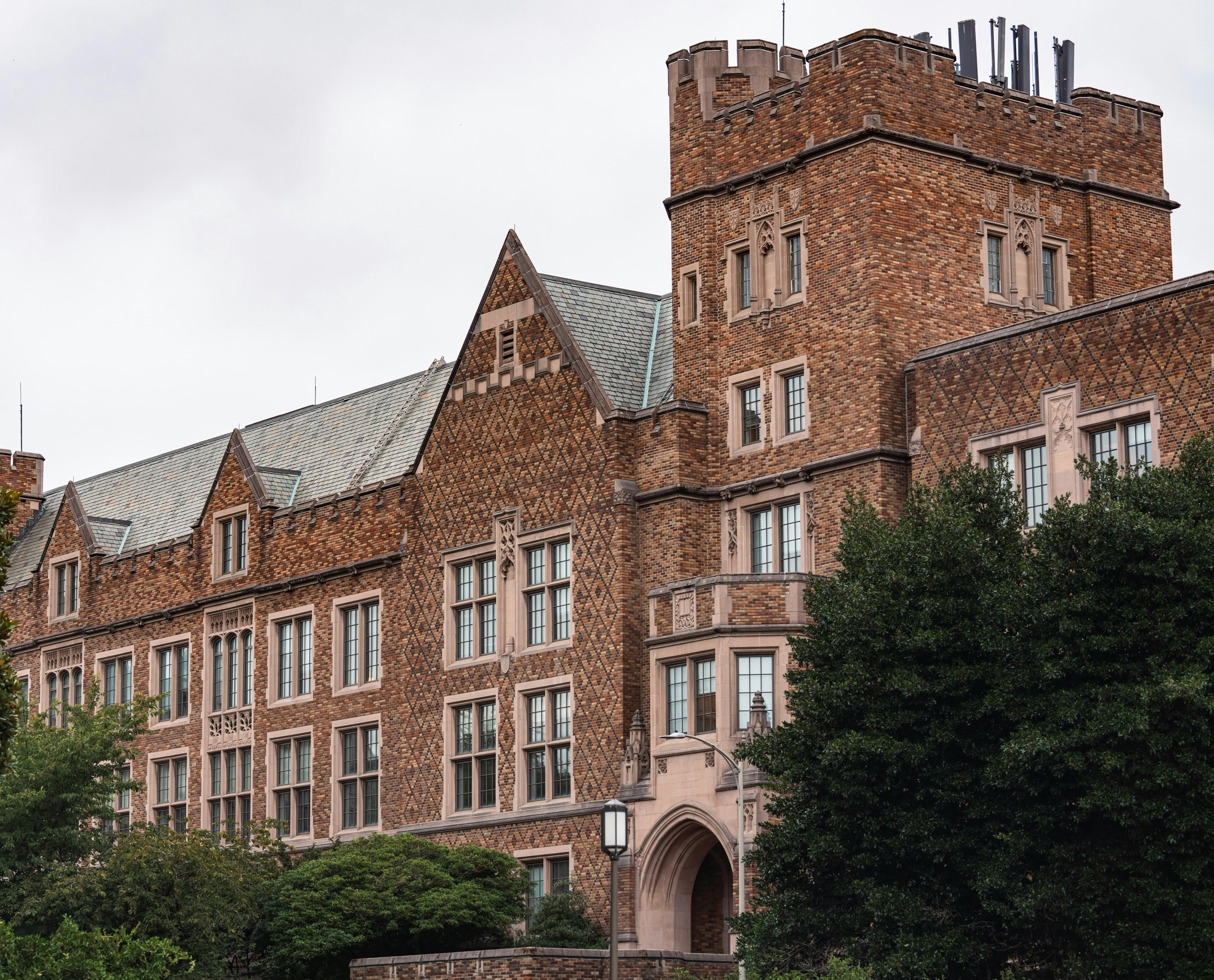 Historic Brick University Building Exterior · Free Stock Photo