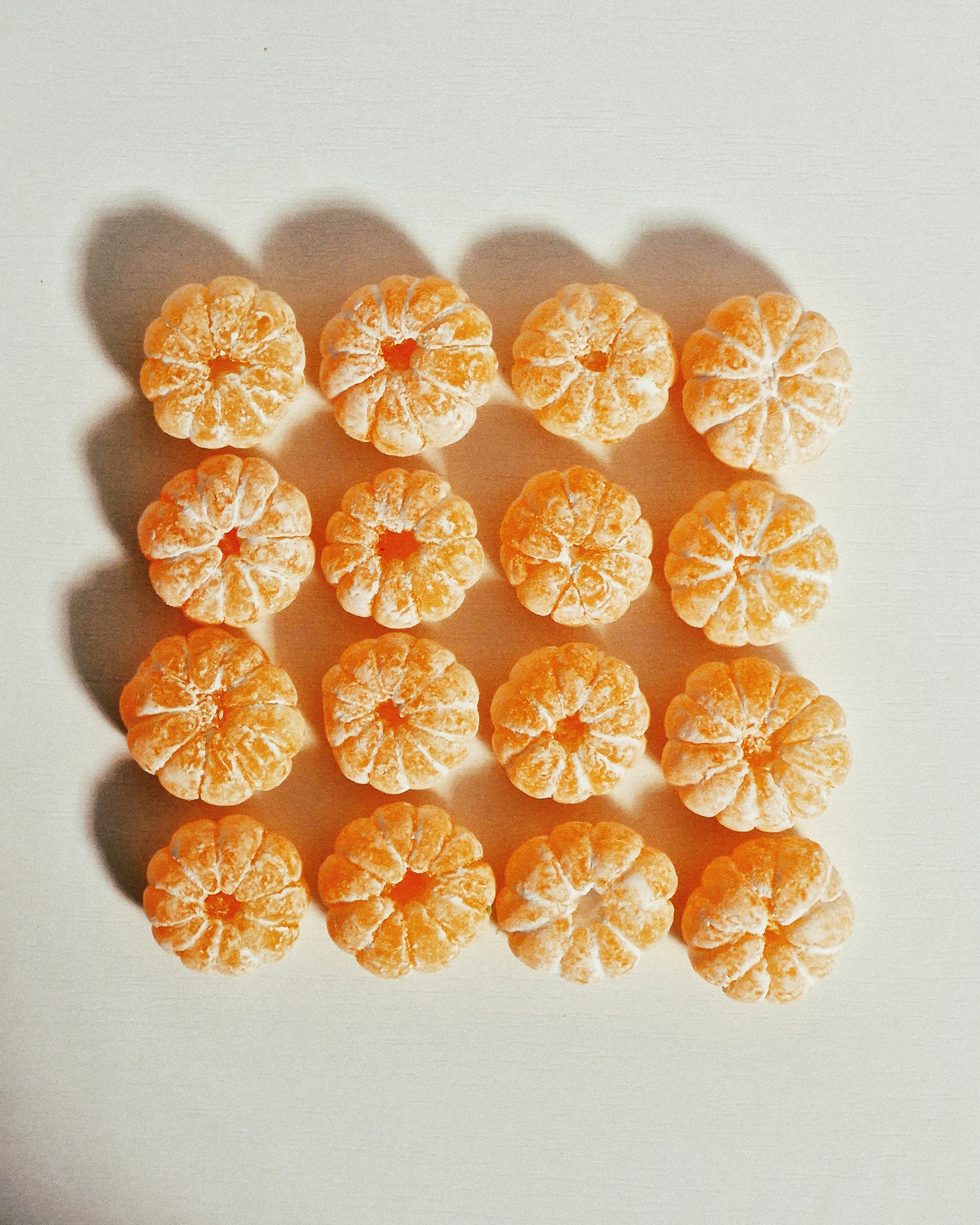 Artistic Display of Tangerine Slices · Free Stock Photo