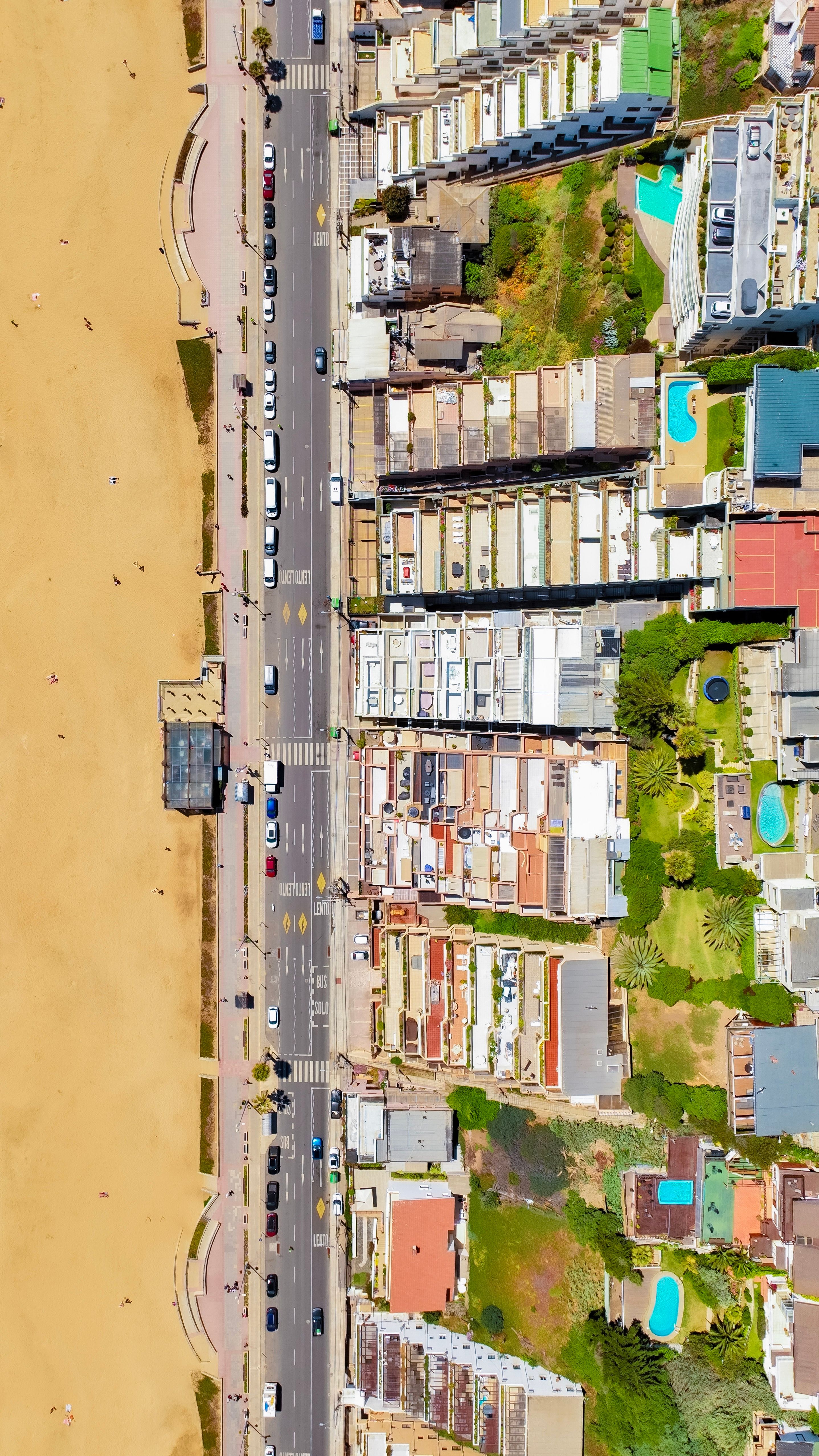 Aerial View of Coastal City with Beachfront · Free Stock Photo