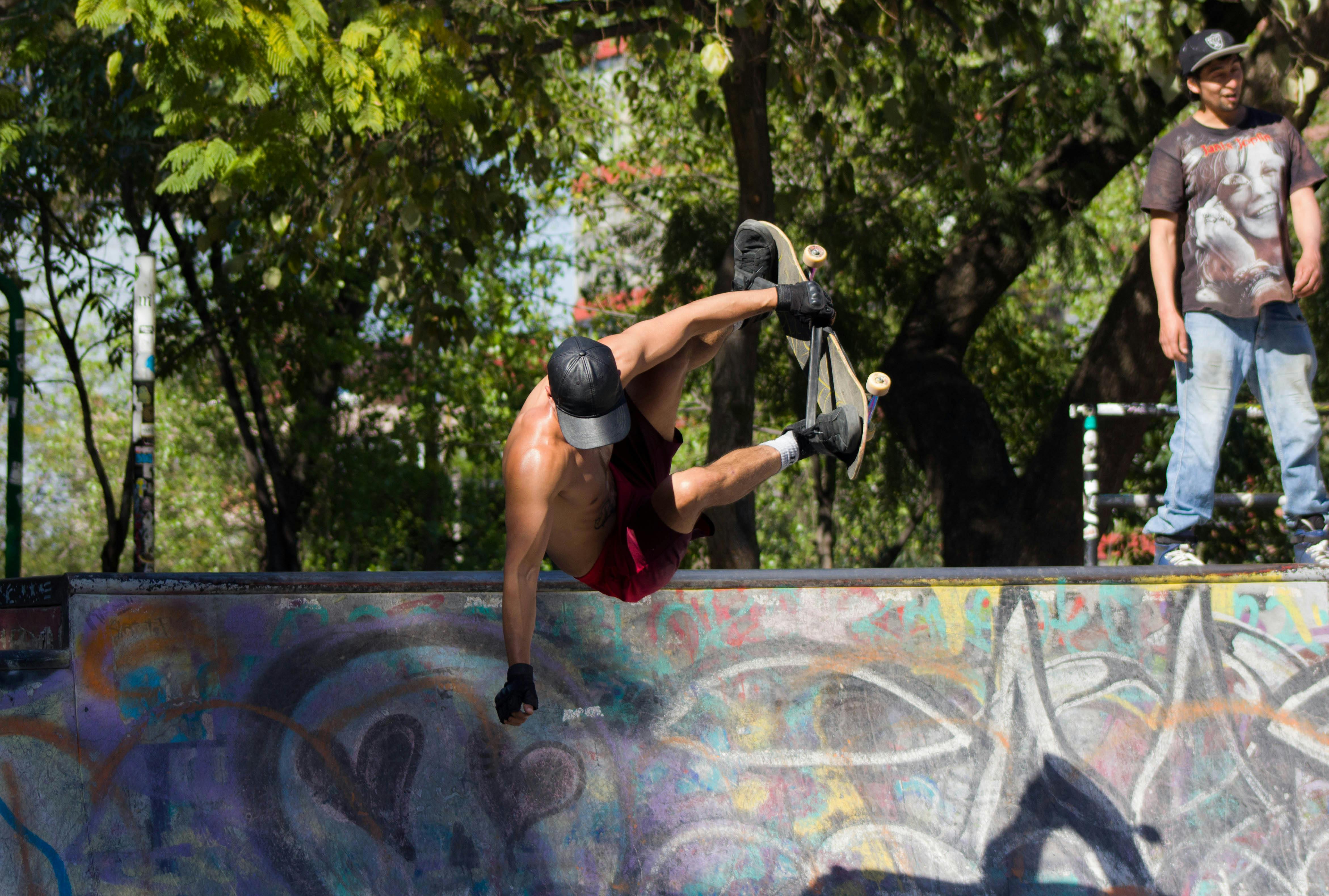 Dynamic Skateboard Trick in Urban Skate Park · Free Stock Photo
