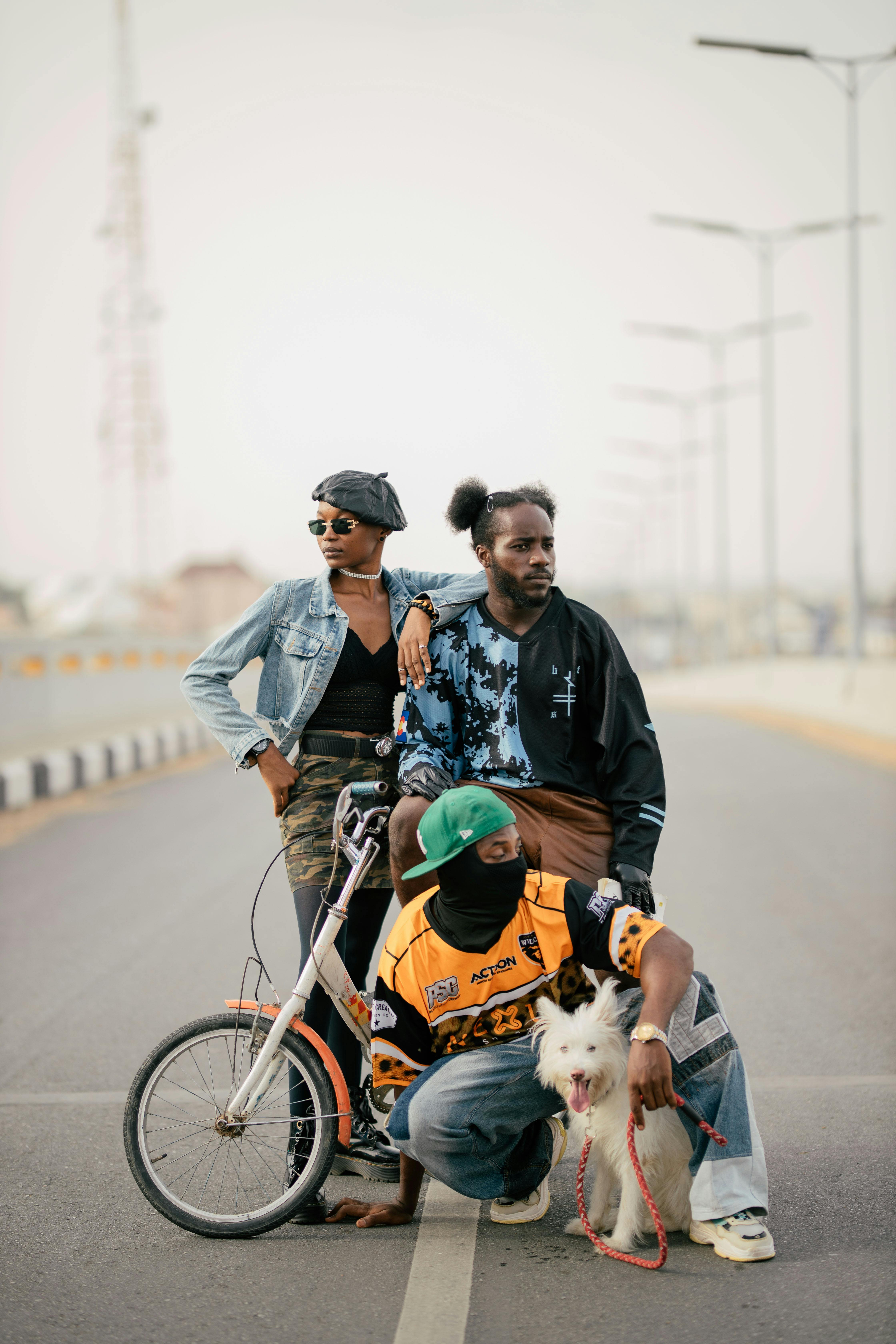 Urban Street Style with Friends and Dog on Road · Free Stock Photo