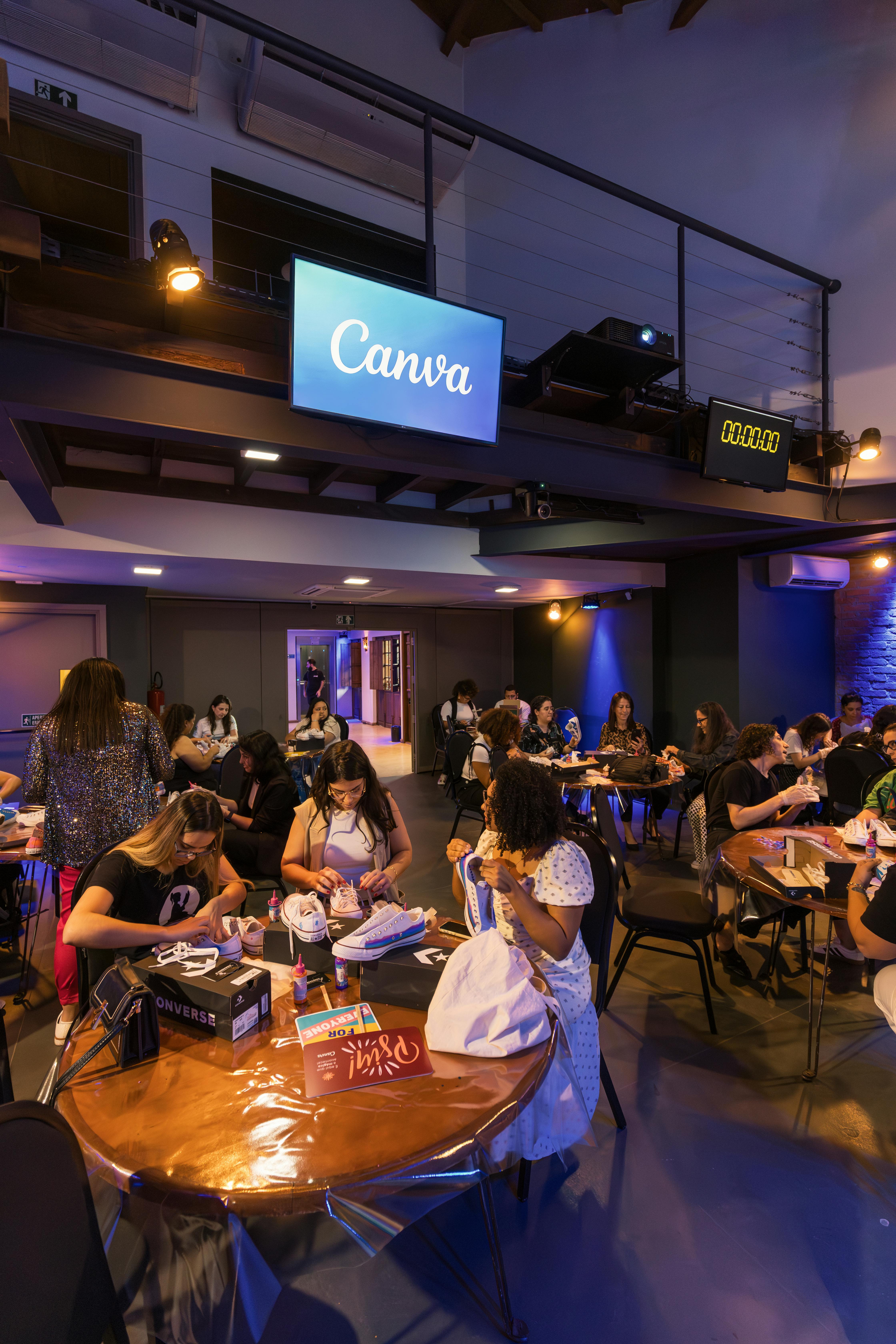 Vibrant Indoor Gathering at Canva Event · Free Stock Photo