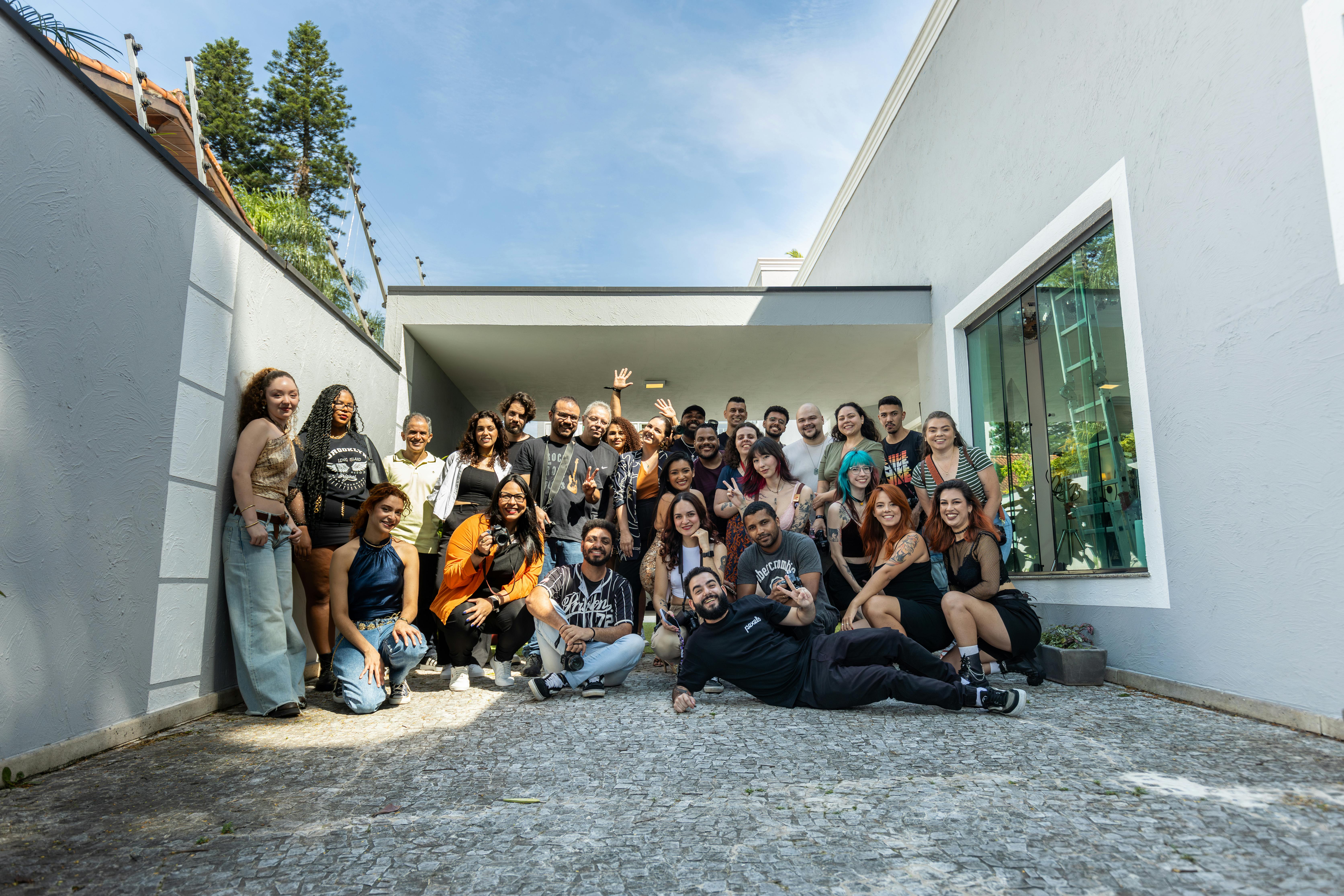 Diverse Group Gathering Outdoors at Modern Building · Free Stock Photo