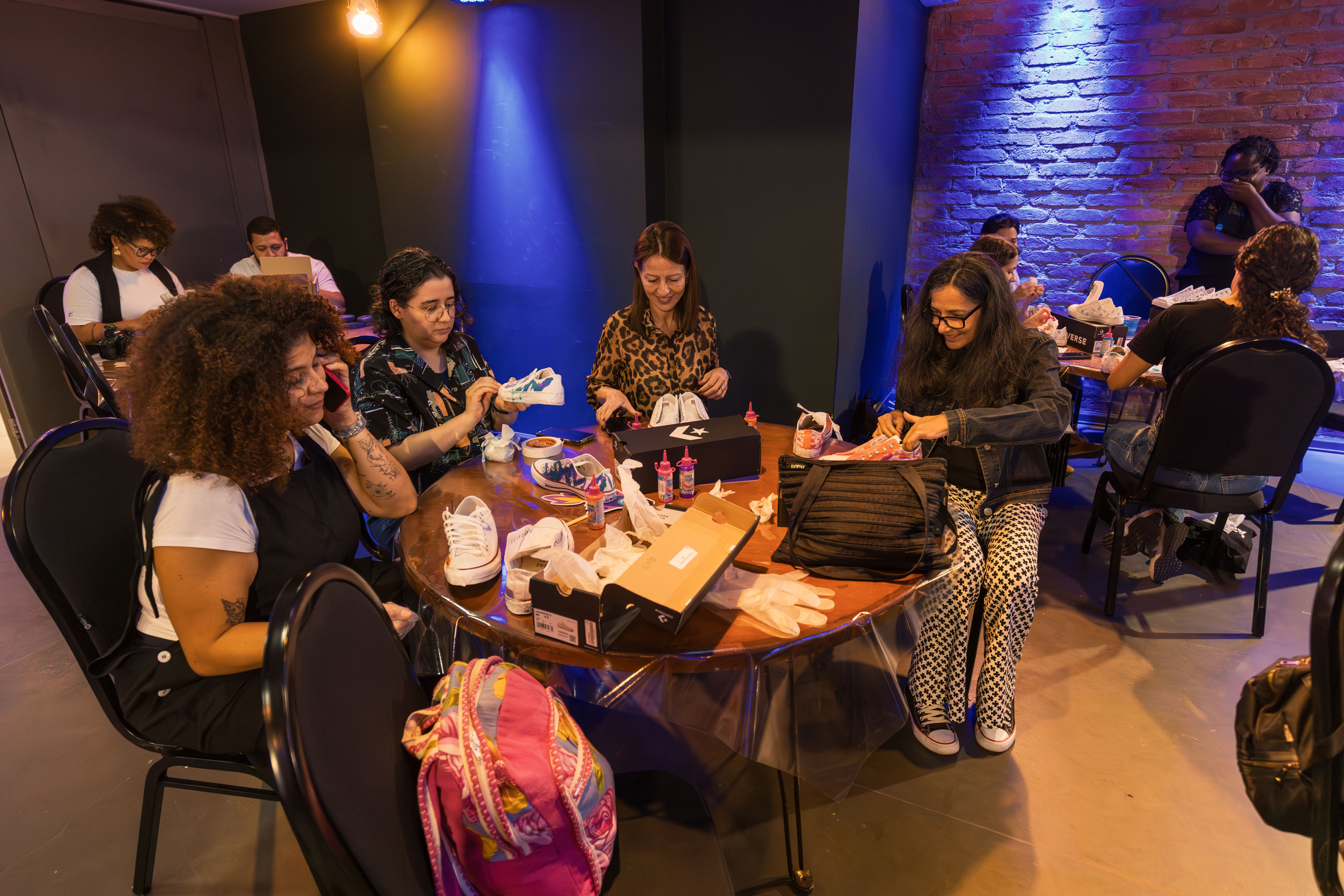Creative Shoe Customization Workshop in Studio · Free Stock Photo