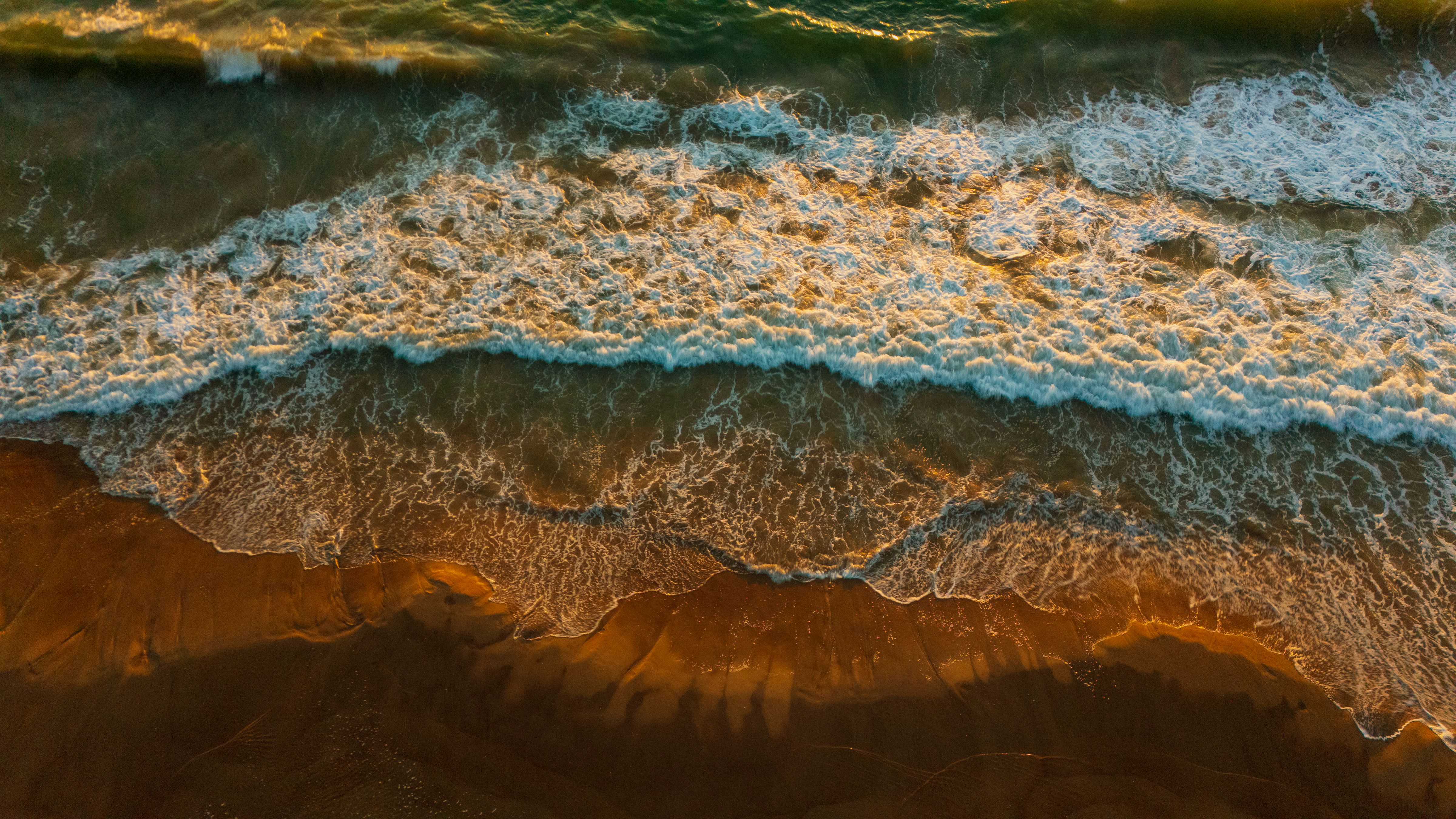 Aerial View of Beach Waves at Punta del Este Sunset · Free Stock Photo