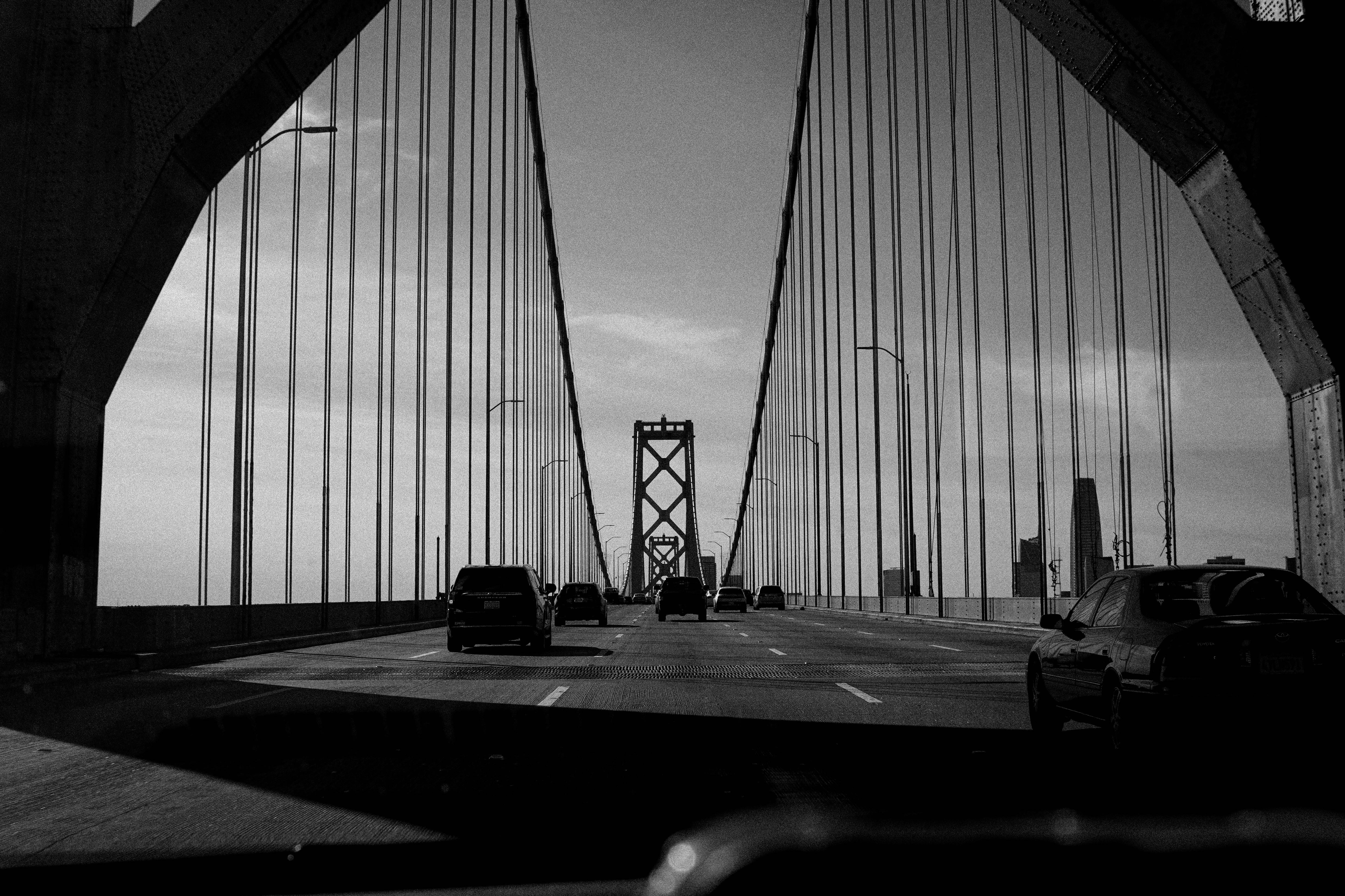 Black and White City Bridge with Traffic Scene · Free Stock Photo