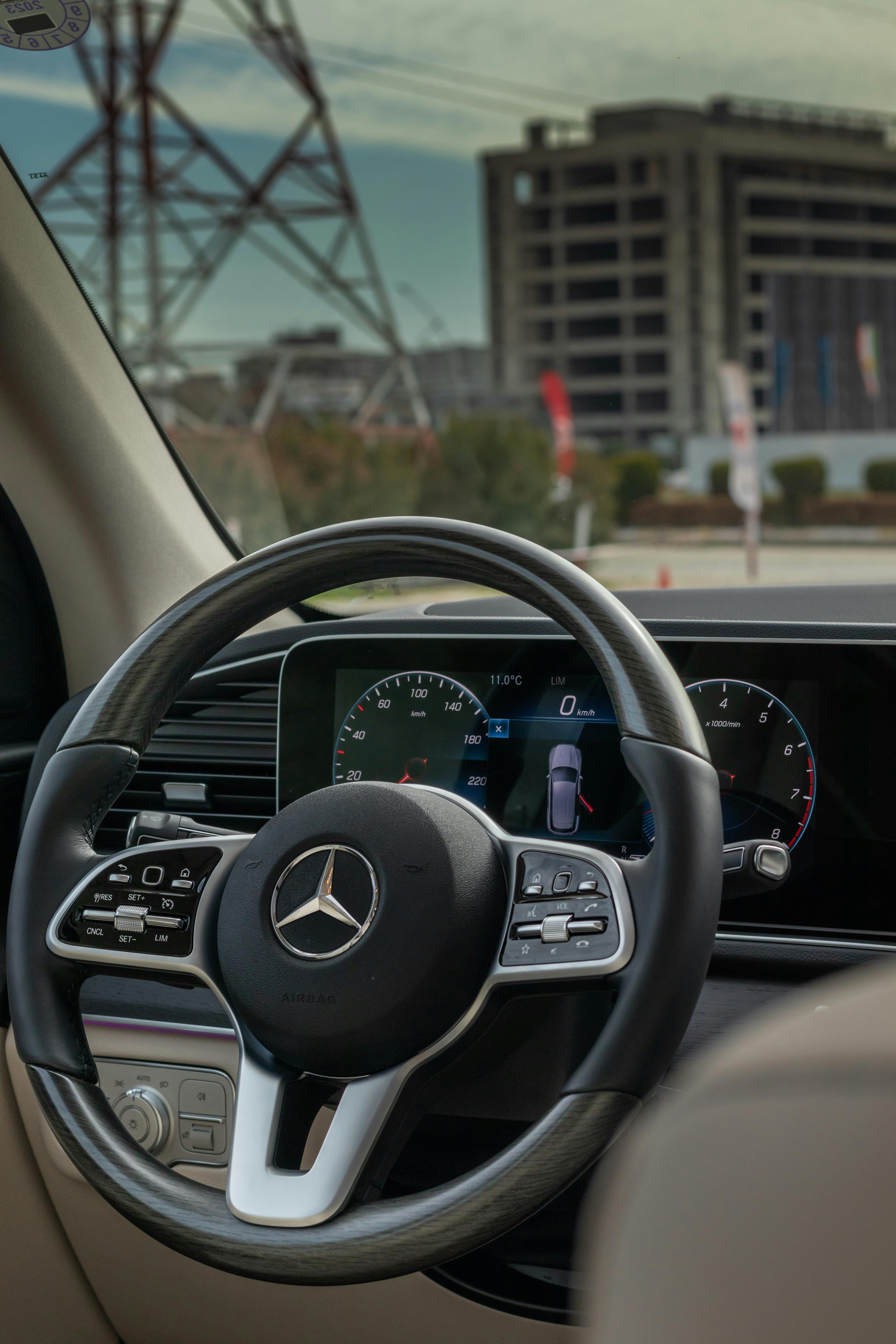 Luxury Mercedes Car Interior with City View · Free Stock Photo