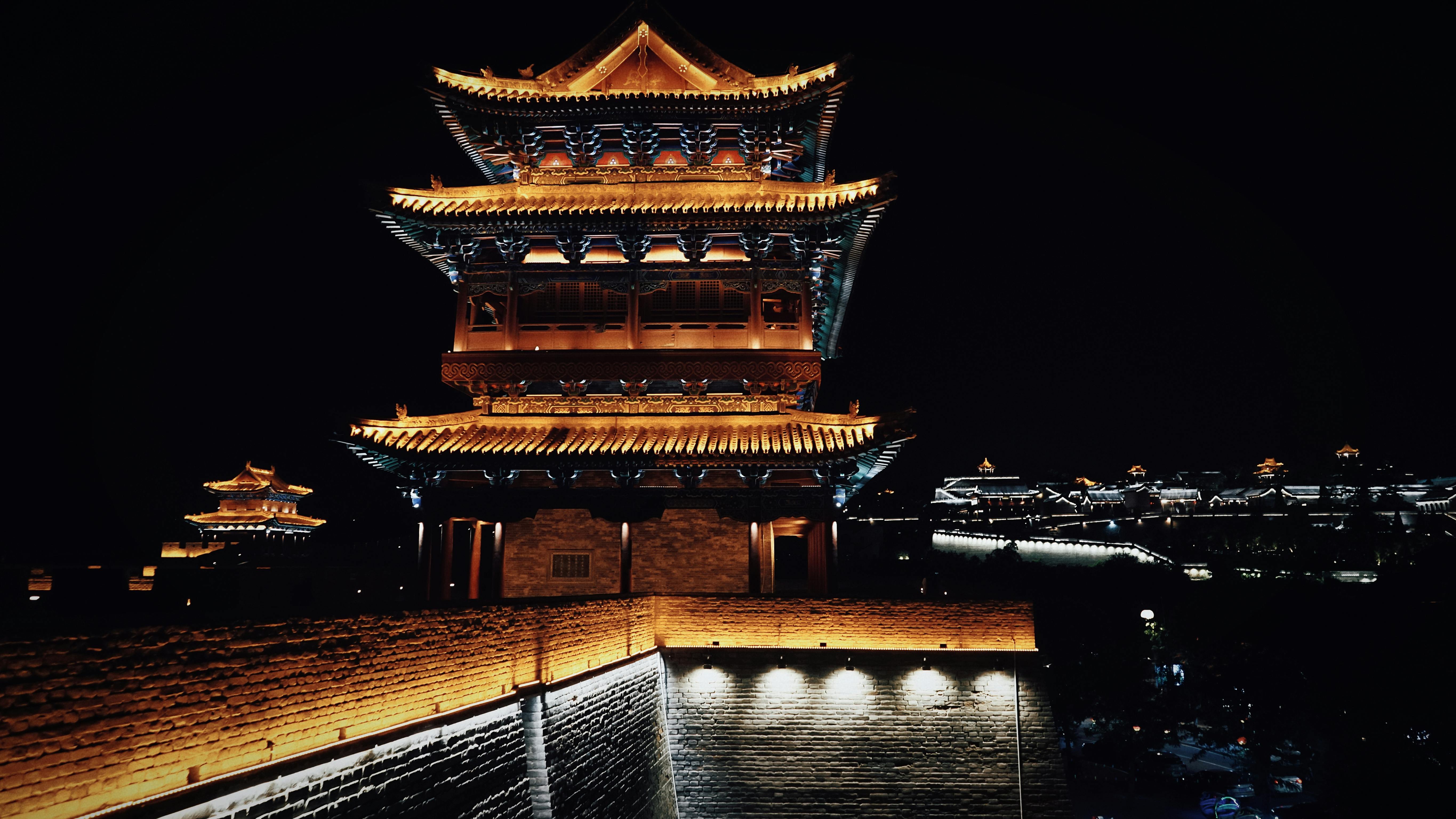 Illuminated Ancient Chinese Architecture at Night · Free Stock Photo