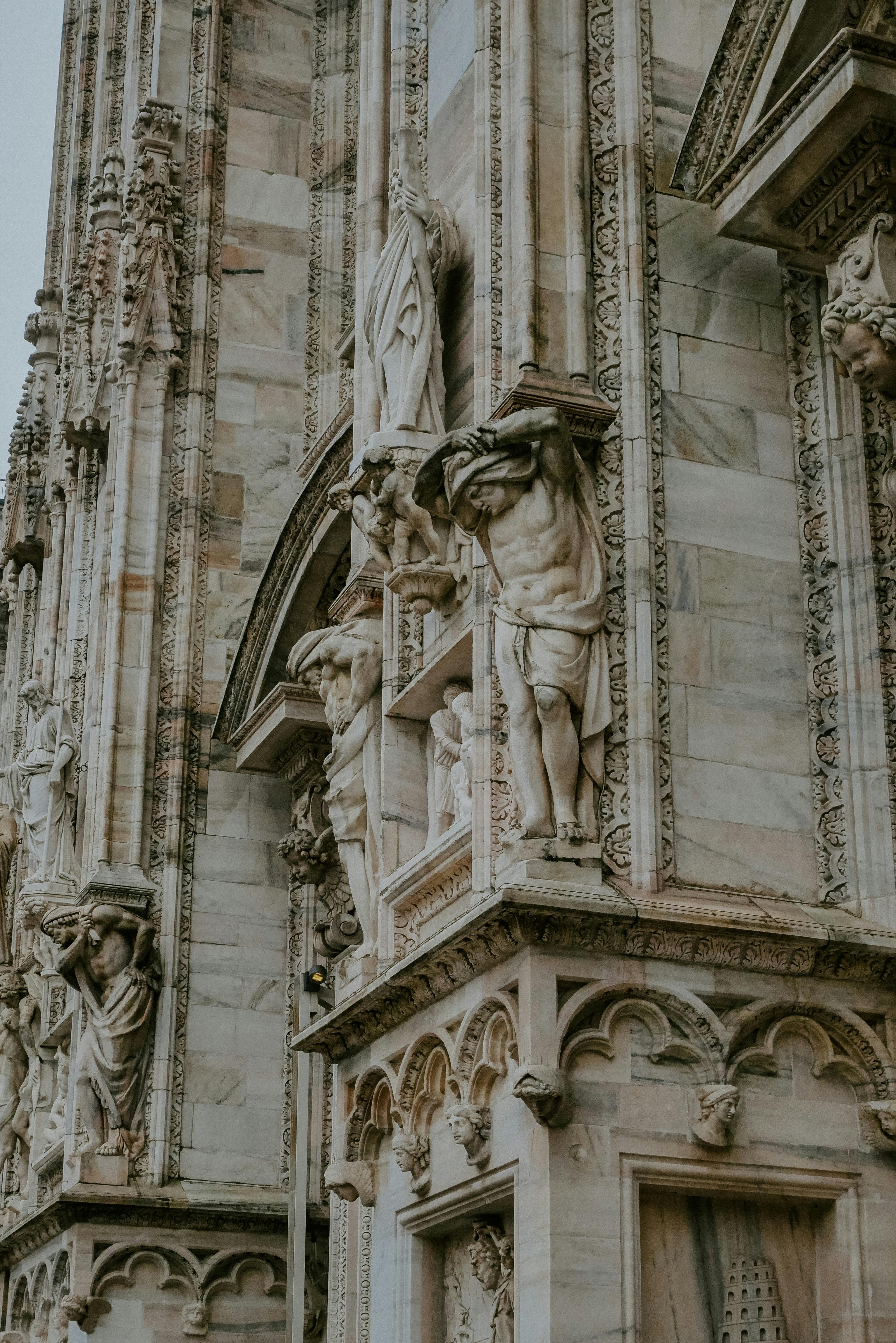 Ornate Stone Carvings on Historical Cathedral Façade · Free Stock Photo