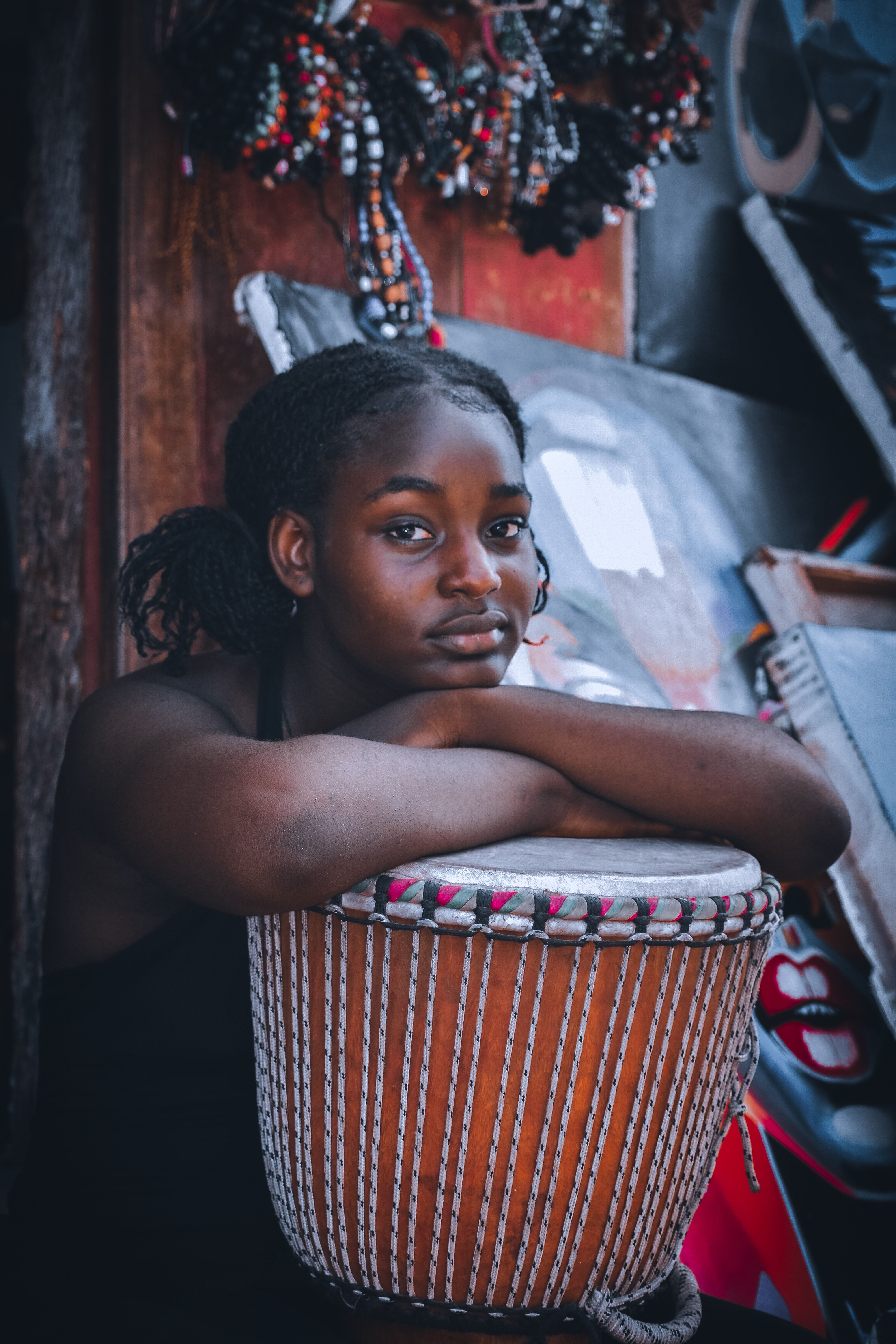 Portrait of Young Woman with African Drum in Monrovia · Free Stock Photo