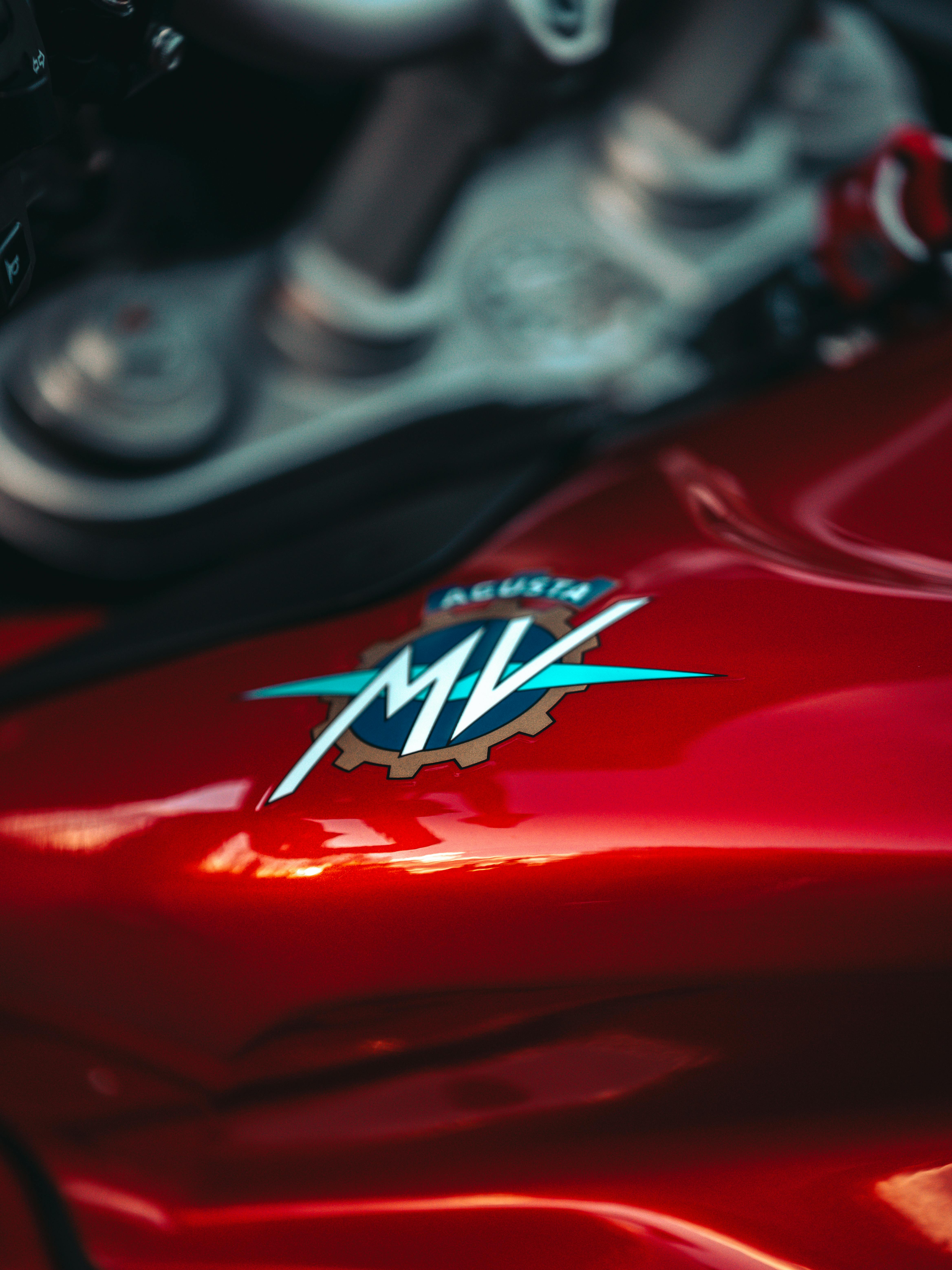 Close-up of Red MV Agusta Motorcycle Emblem · Free Stock Photo