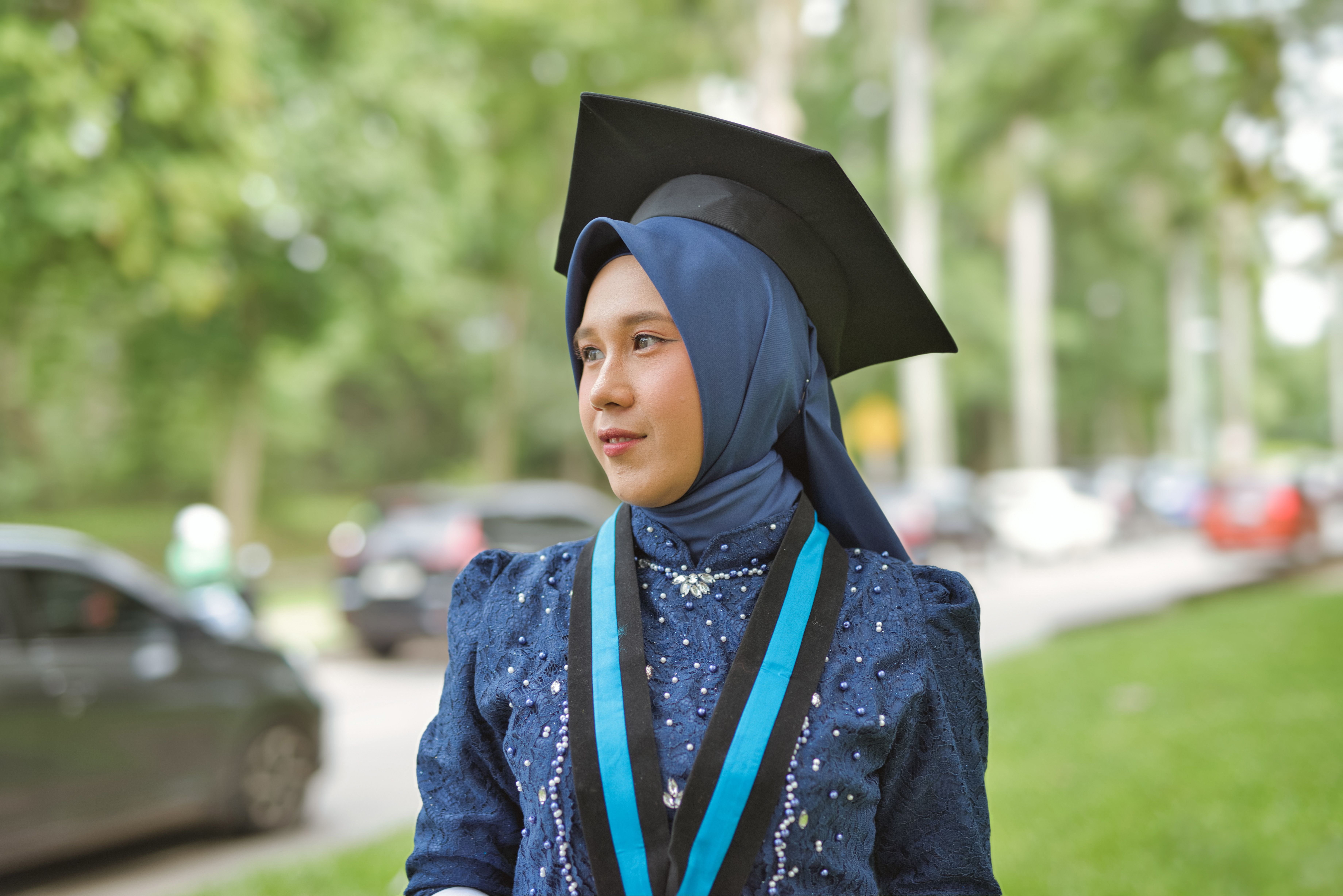 Young Woman in Hijab at Graduation Ceremony · Free Stock Photo