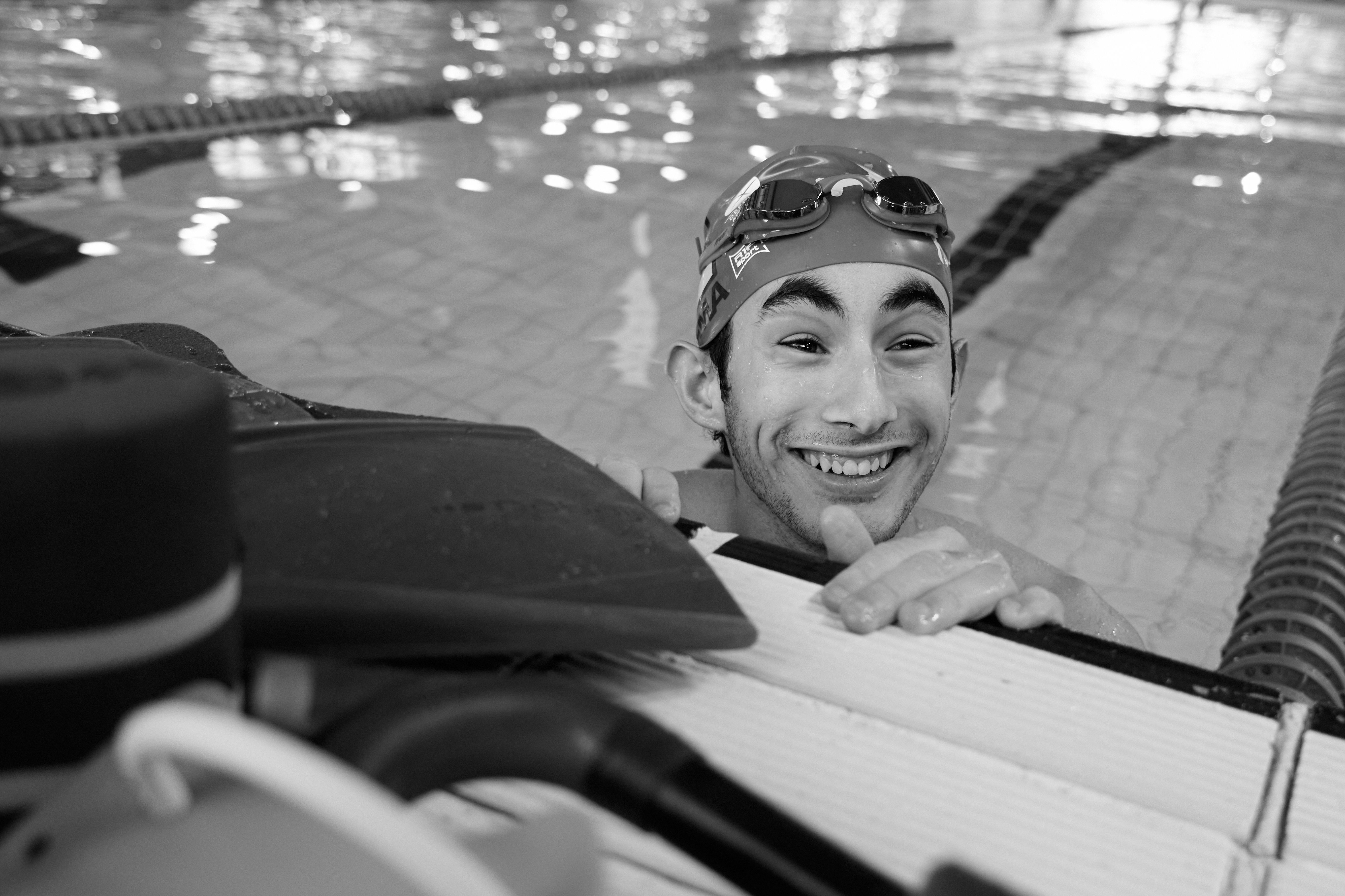 Smiling Male Swimmer in Indoor Pool · Free Stock Photo