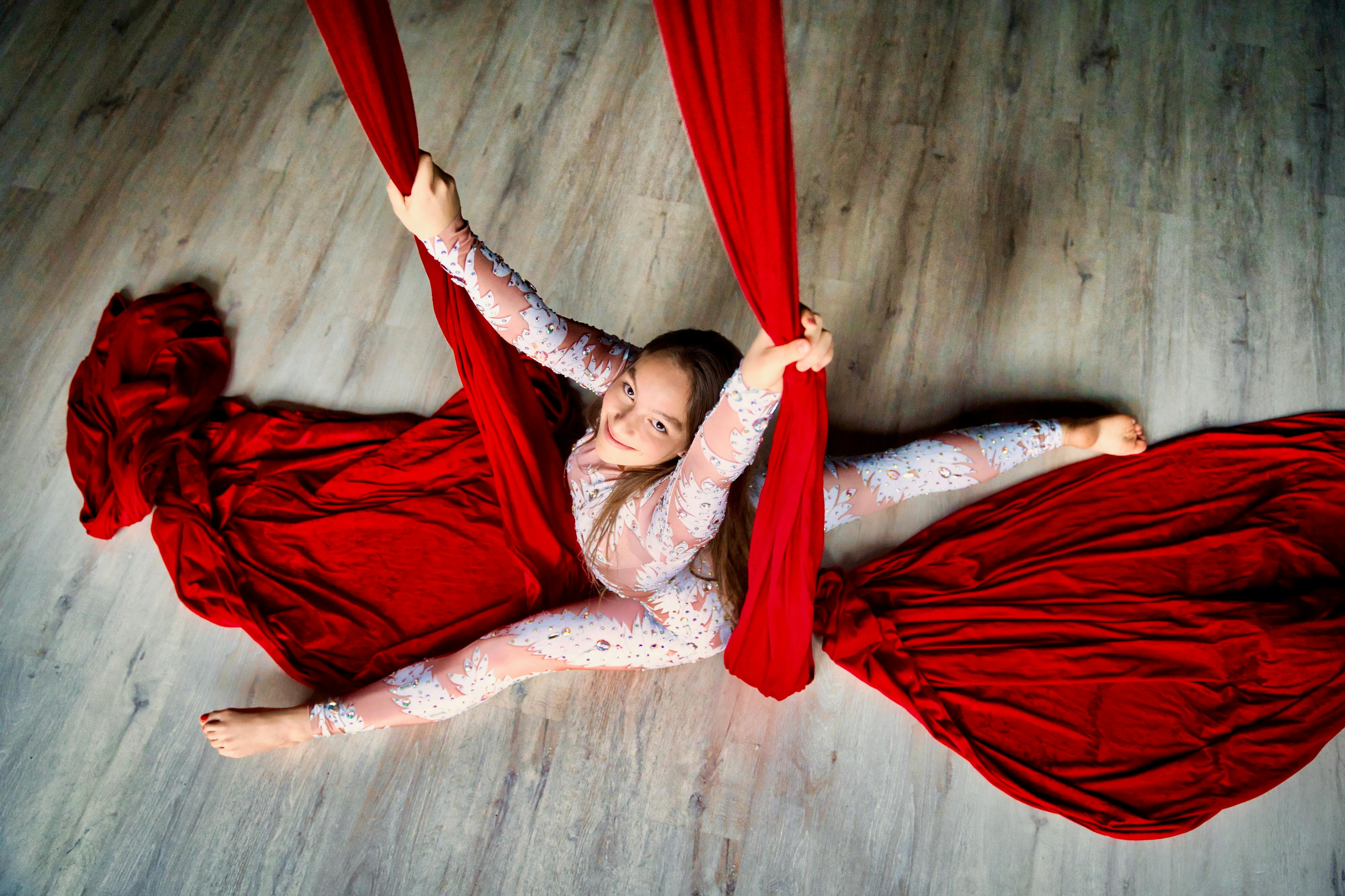 Aerial Silk Acrobat Performing Indoor Routine · Free Stock Photo
