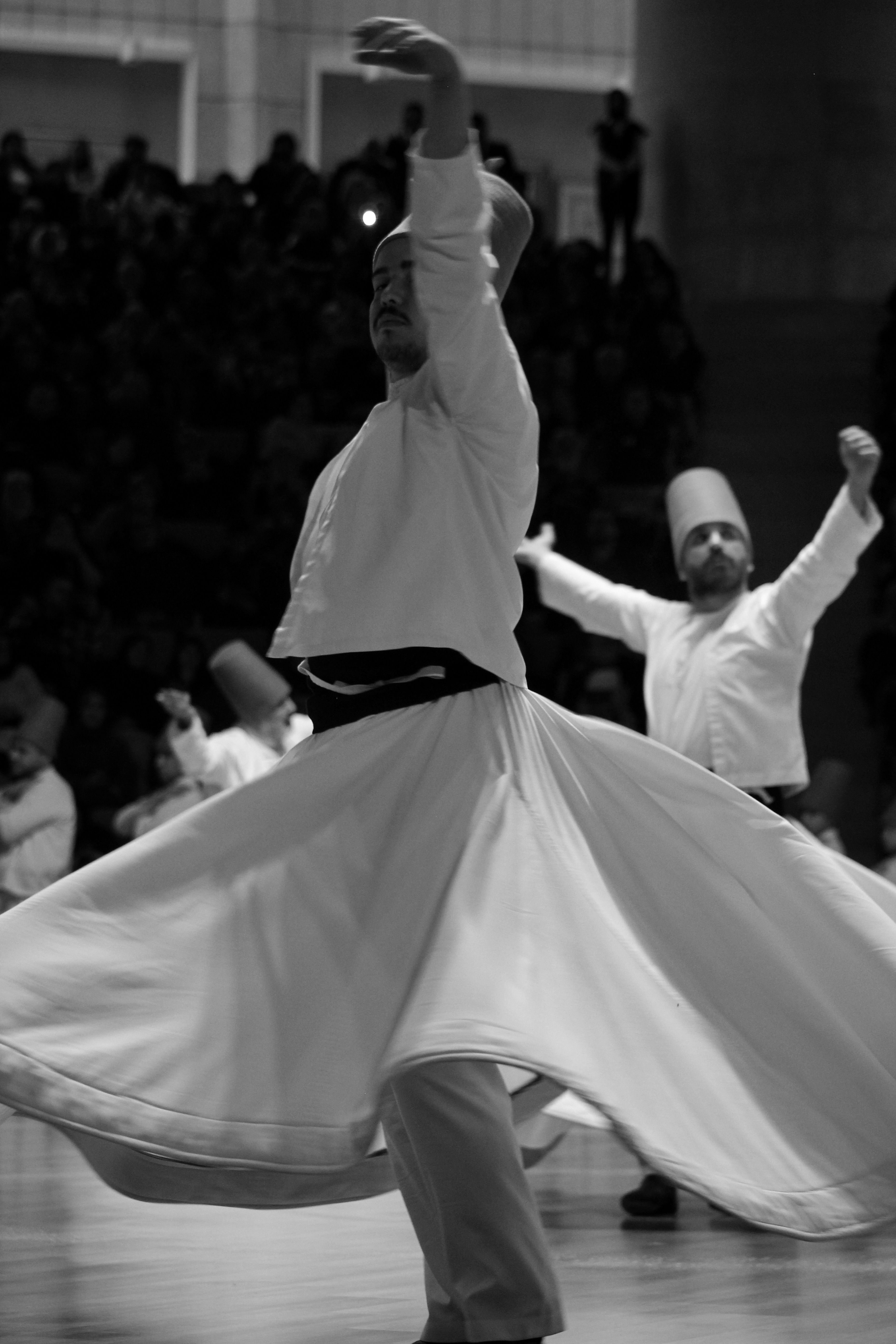 Men Performing in Traditional Clothes · Free Stock Photo