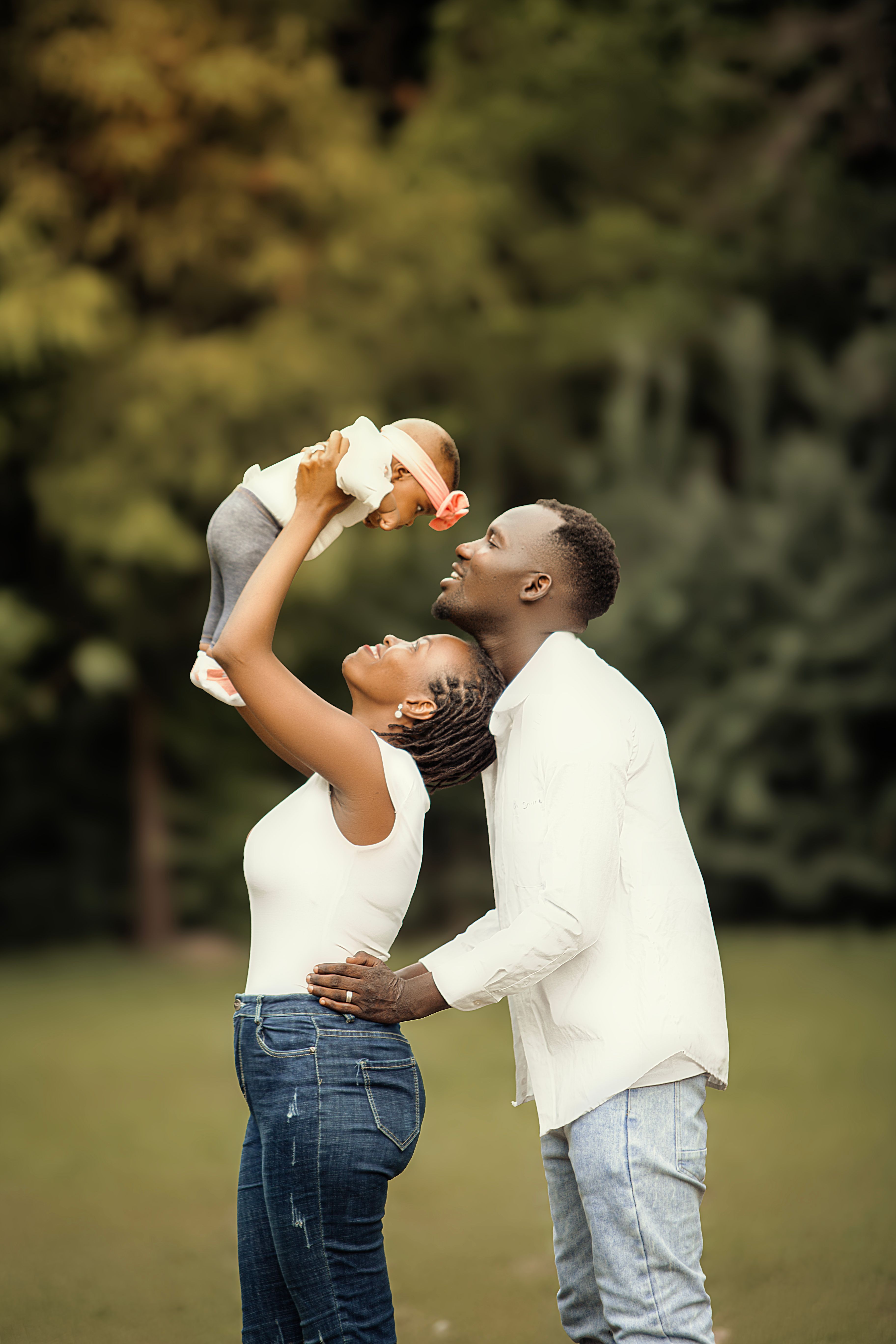 Happy Family Enjoying Time Outdoors Together · Free Stock Photo