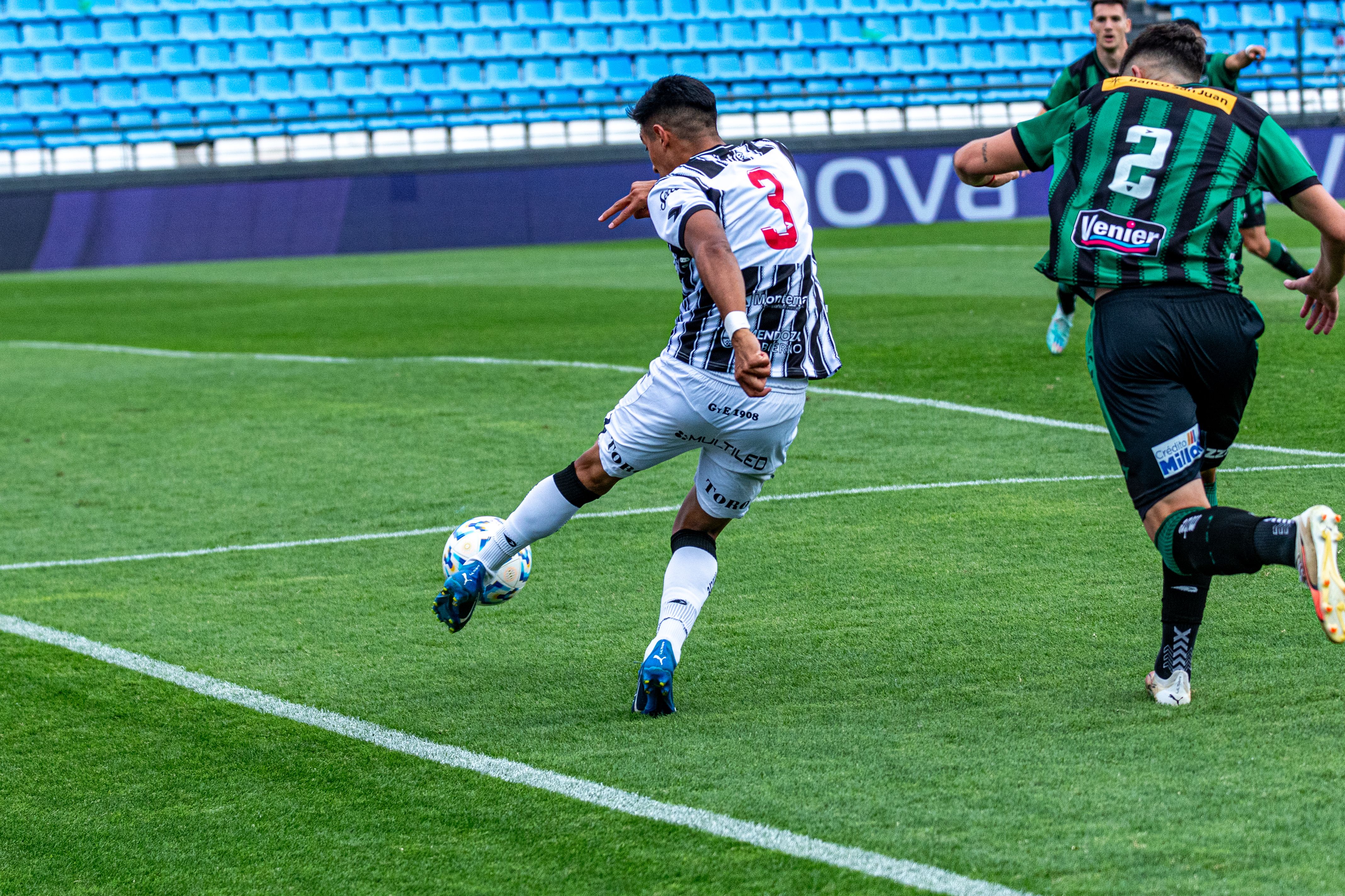 Dynamic Football Match with Intense Action · Free Stock Photo