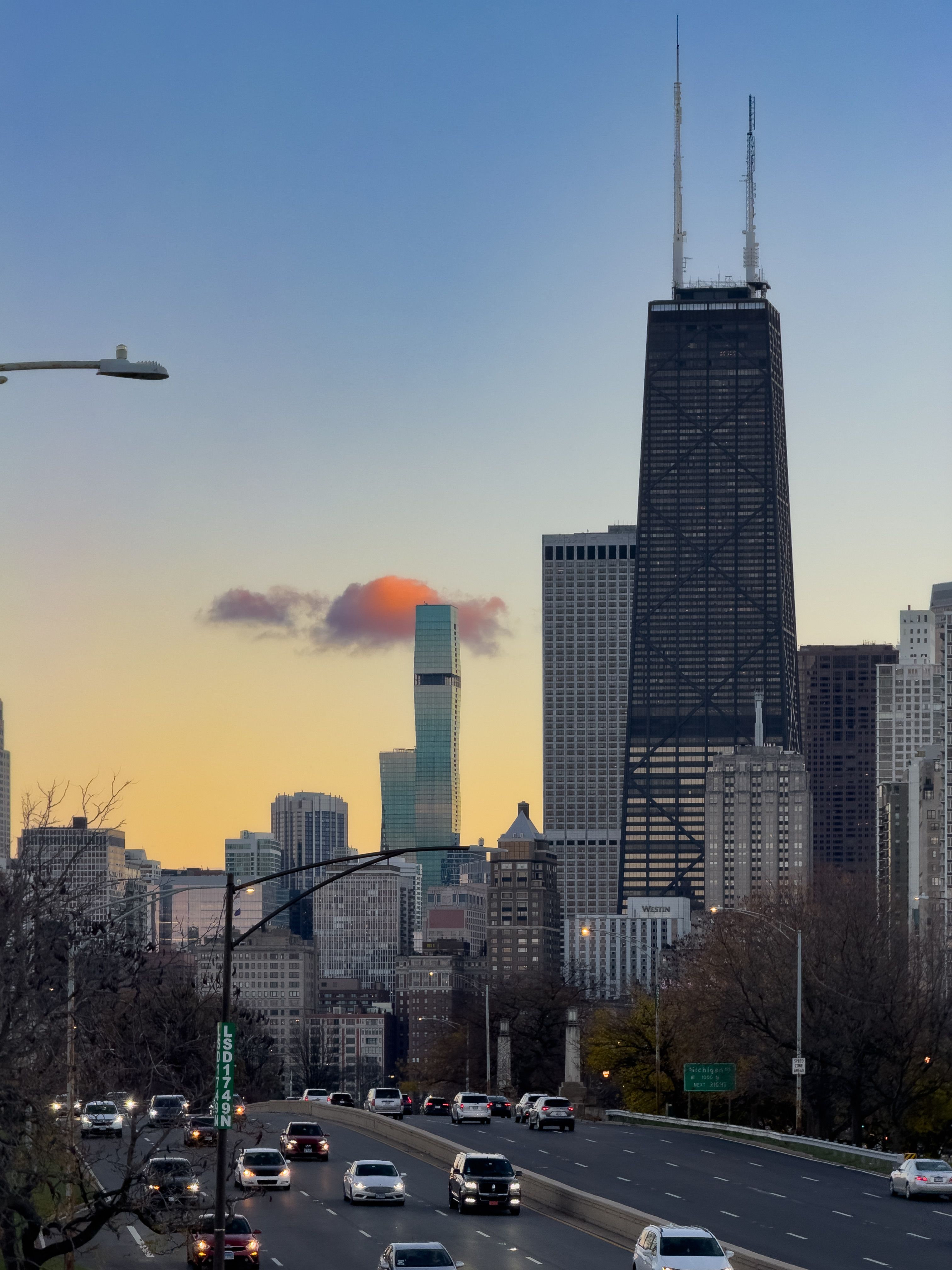 Chicago Skyline at Sunset with Cloudy Sky · Free Stock Photo