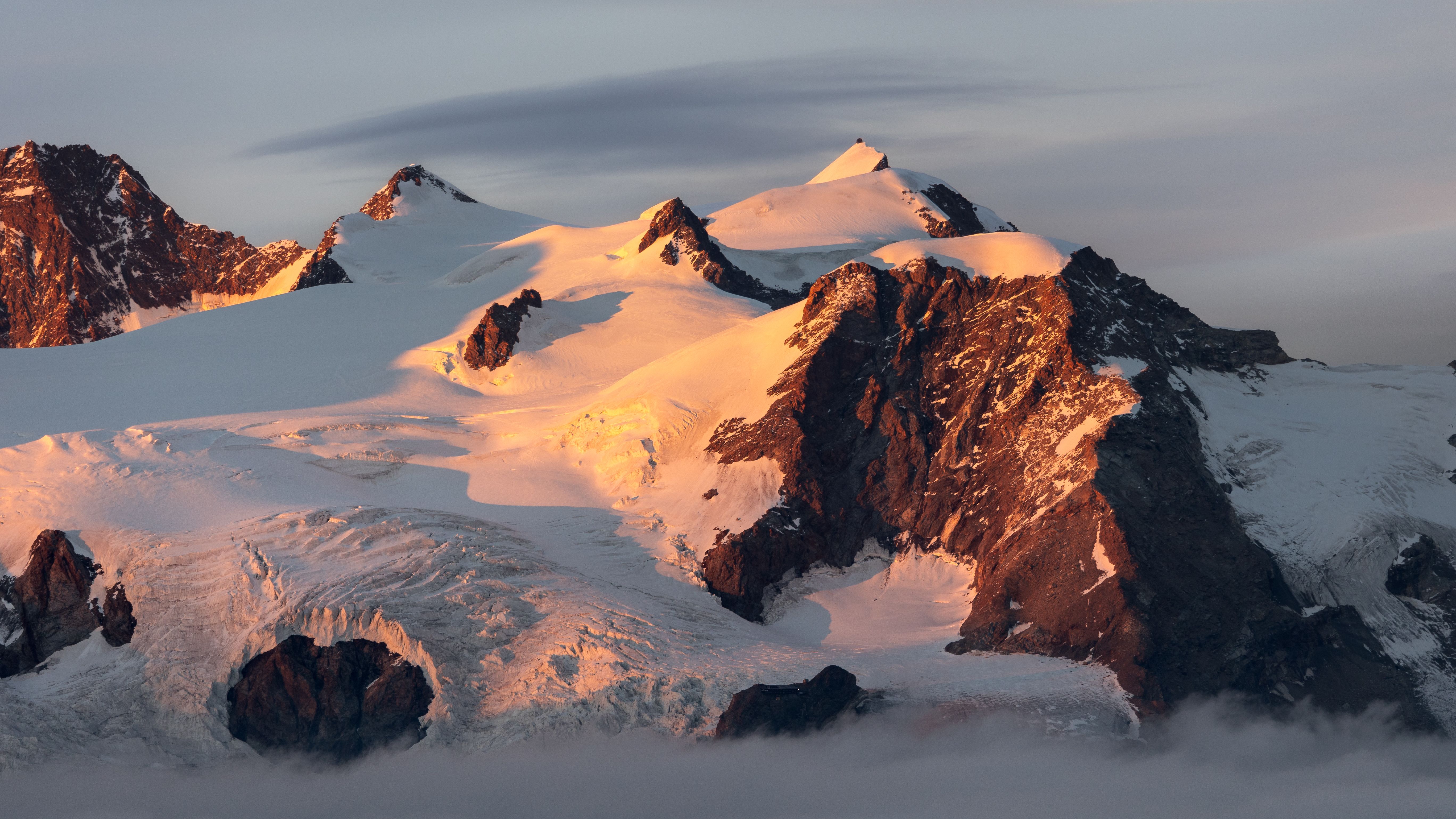 Sunset Over Snow-Covered Mountain Peaks in Italy · Free Stock Photo