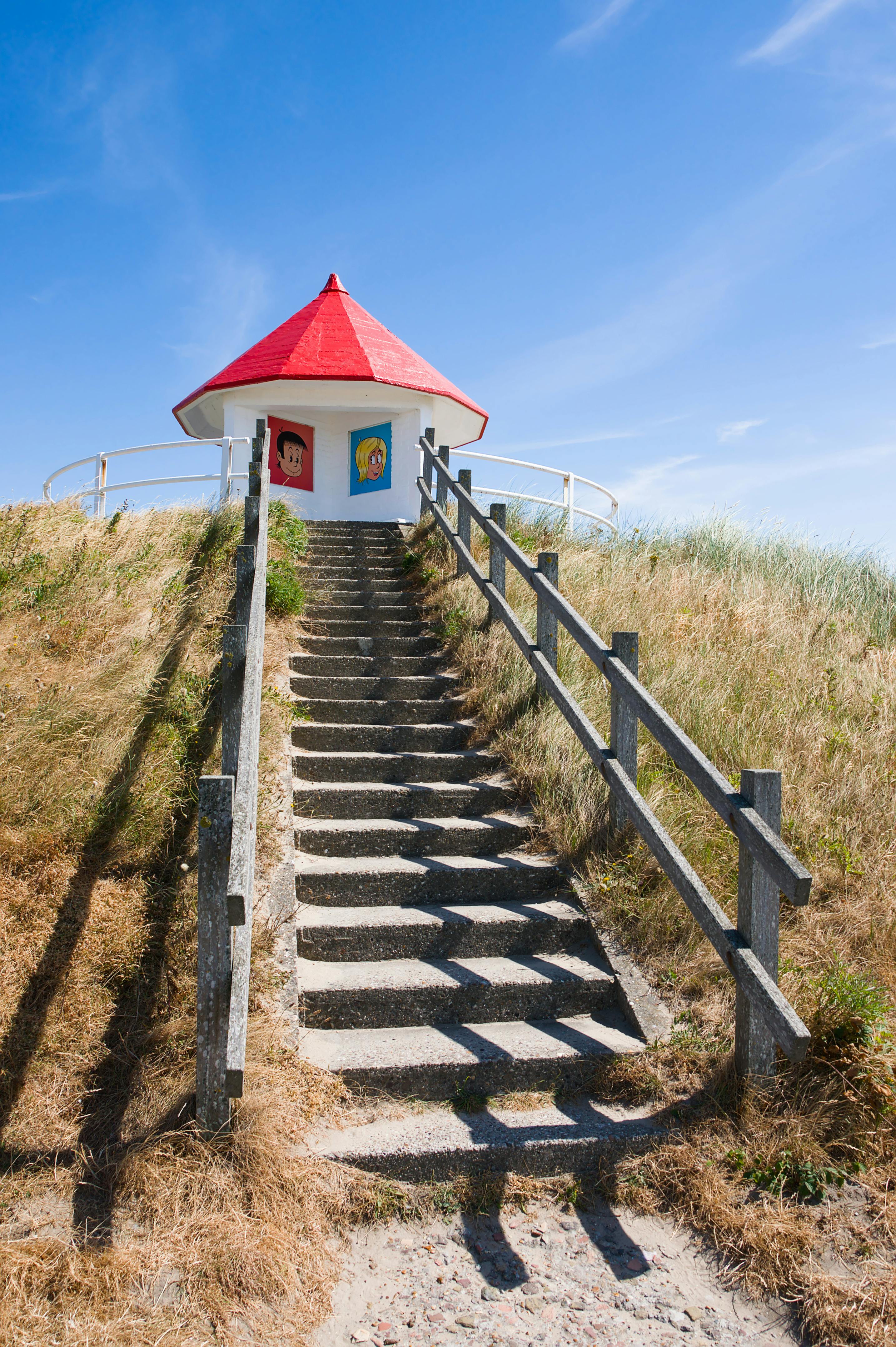 Charming Red Roof Hut with Stone Staircase · Free Stock Photo