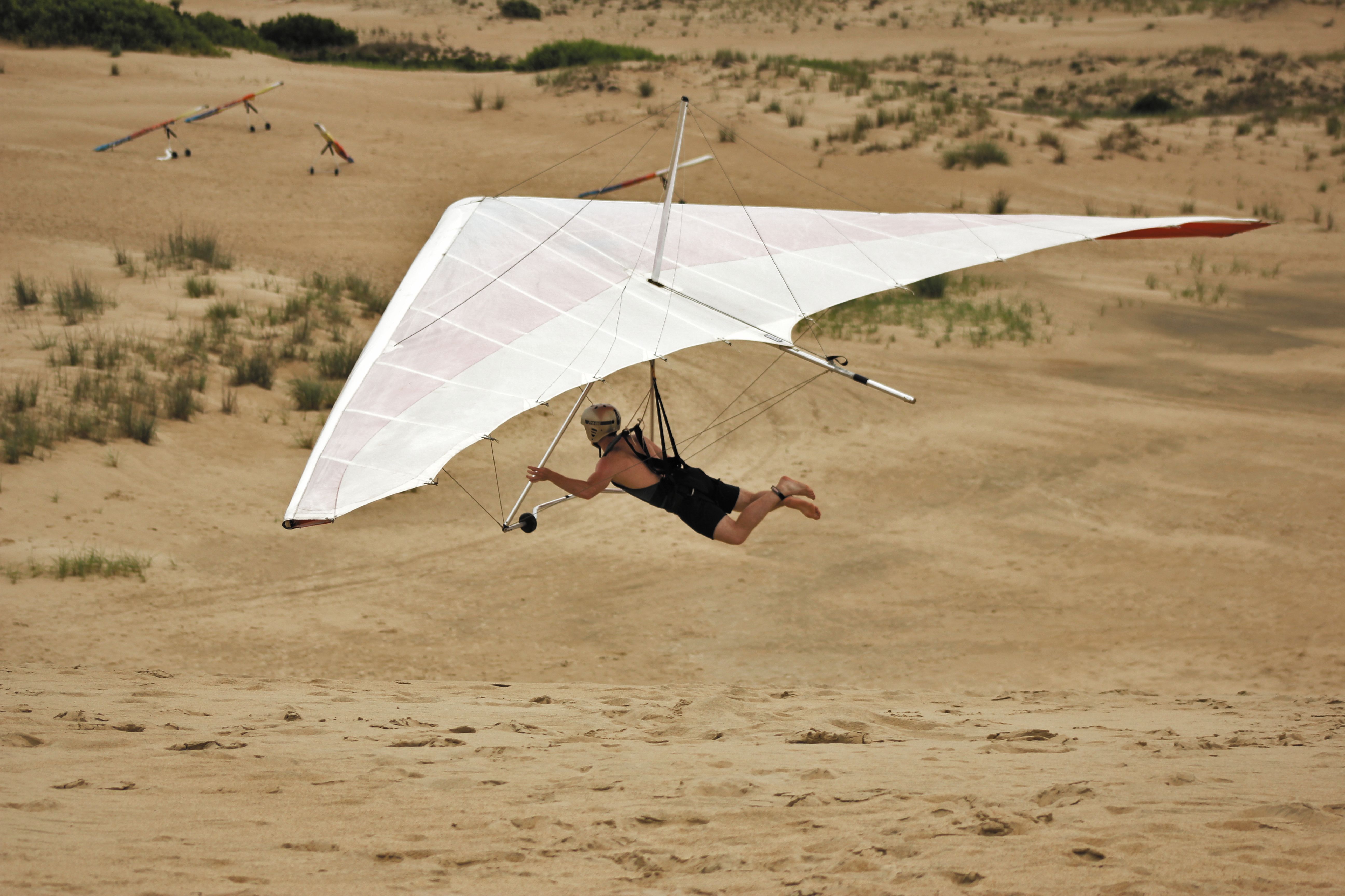 A Person Hang Gliding · Free Stock Photo