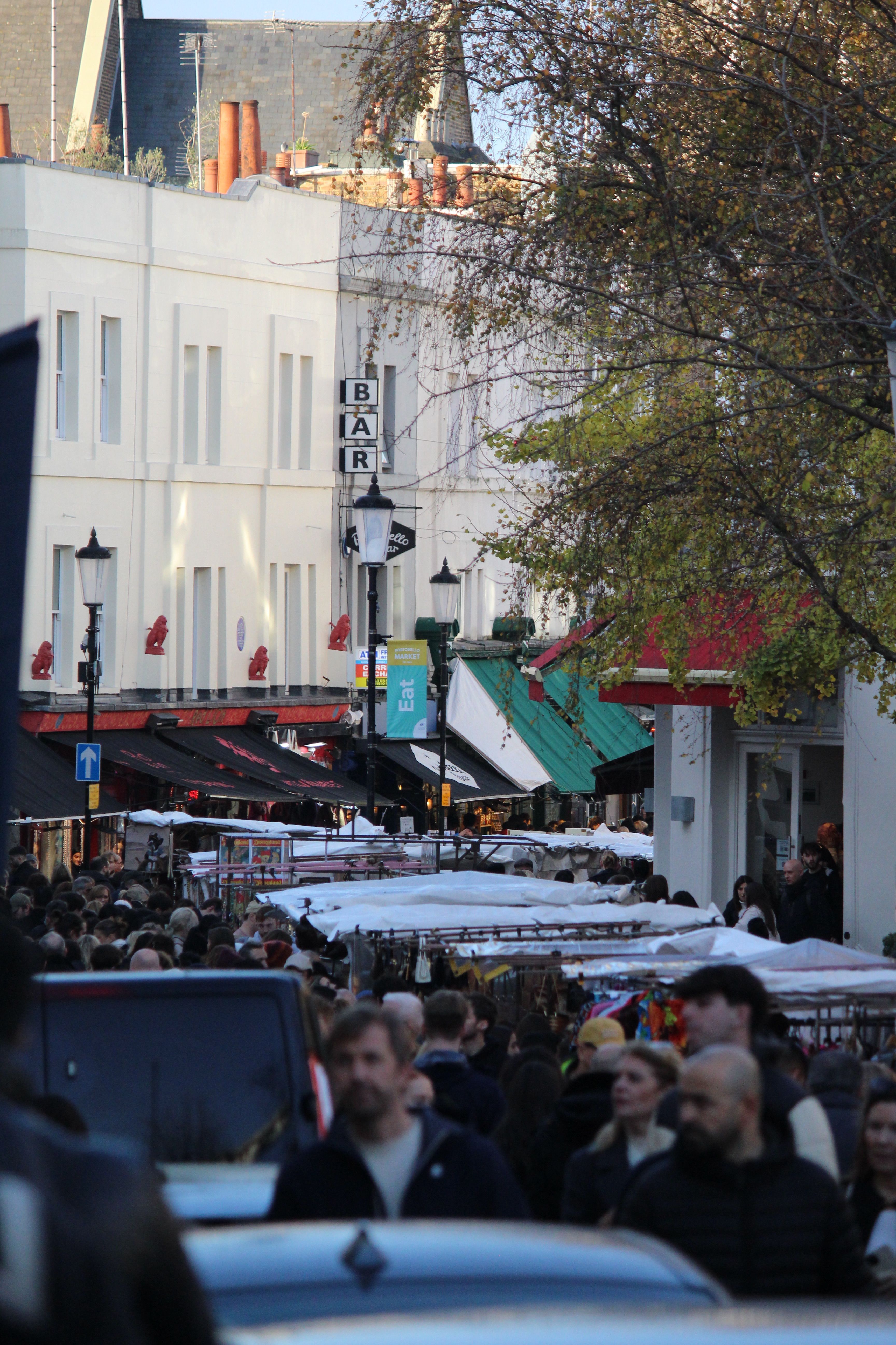 Busy Street Market Scene with Crowded Stalls · Free Stock Photo