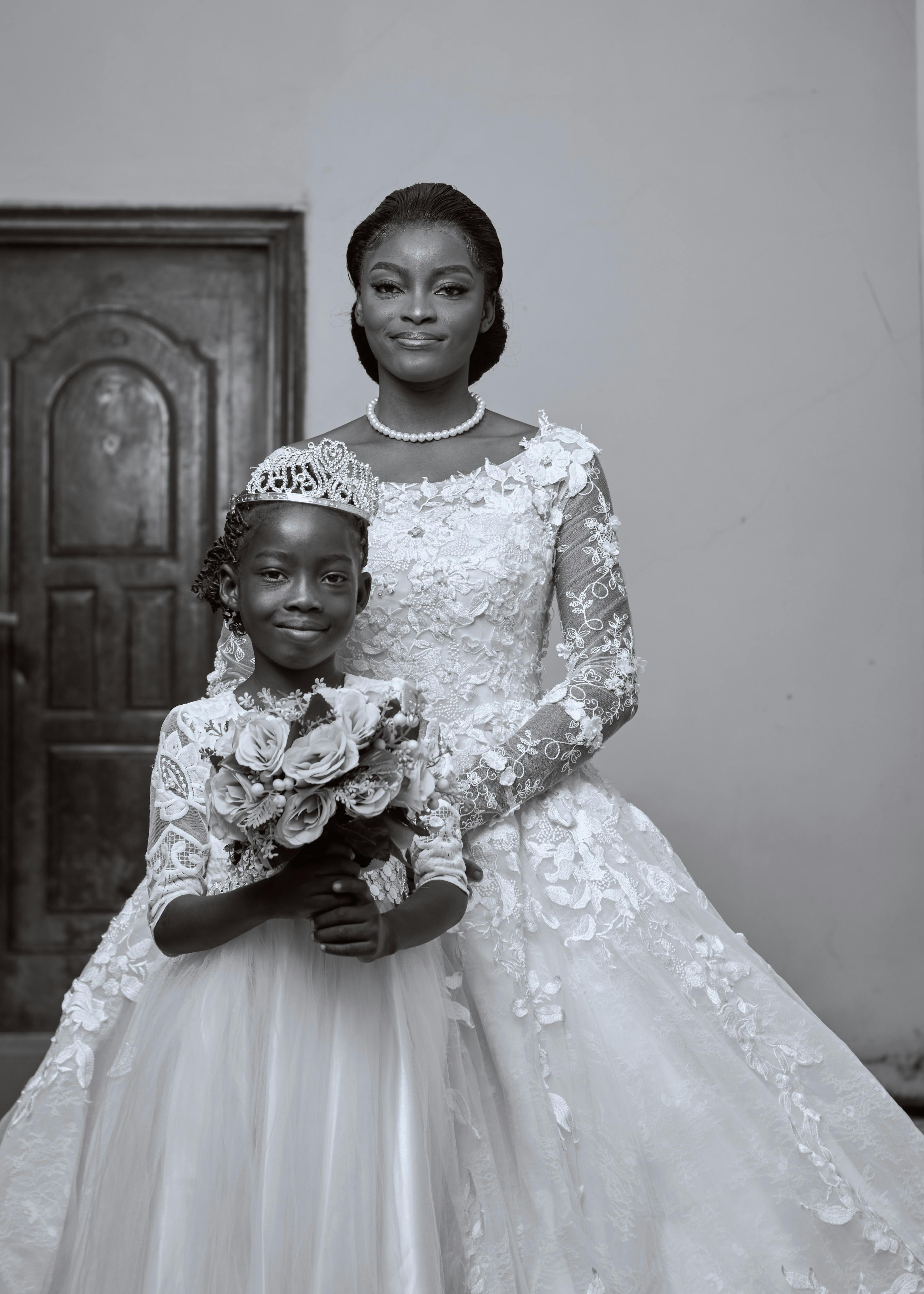 Elegant African Bride with Flower Girl in Nigeria · Free Stock Photo