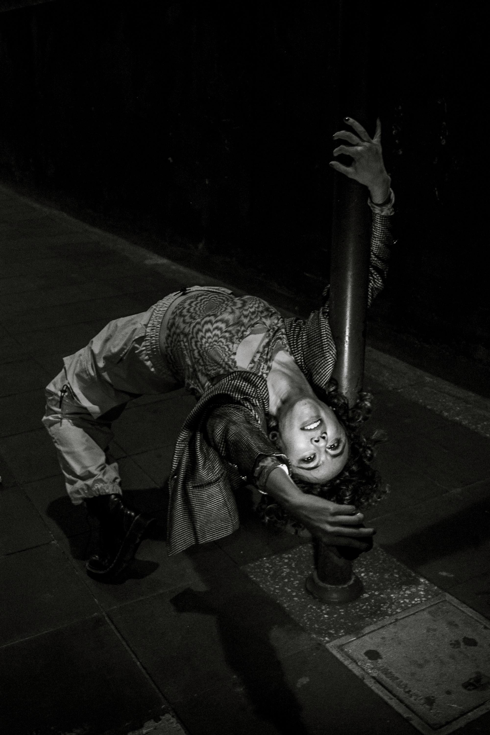 Dynamic Night Street Photography with Performer · Free Stock Photo