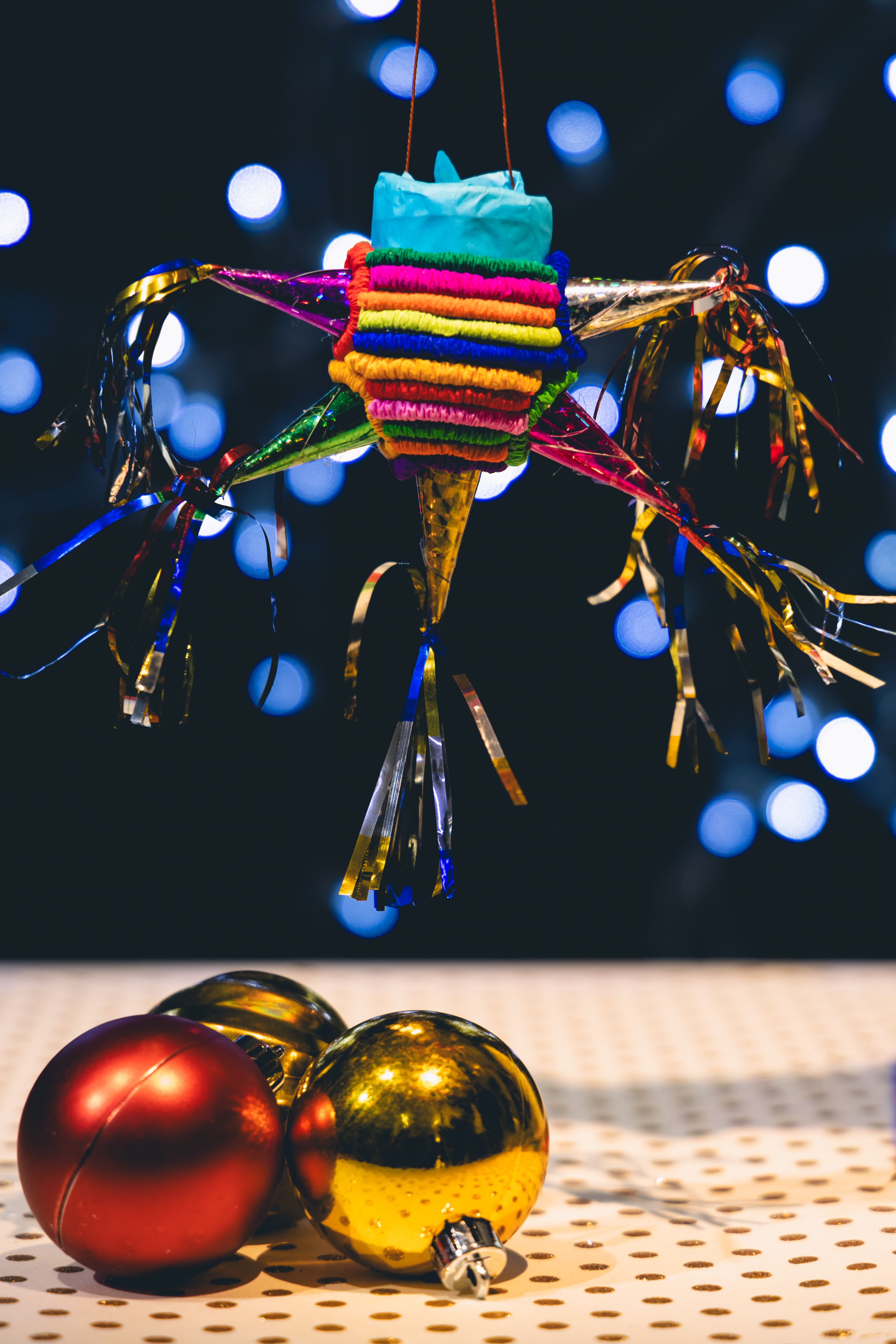 Colorful Piñata and Baubles Festive Display · Free Stock Photo