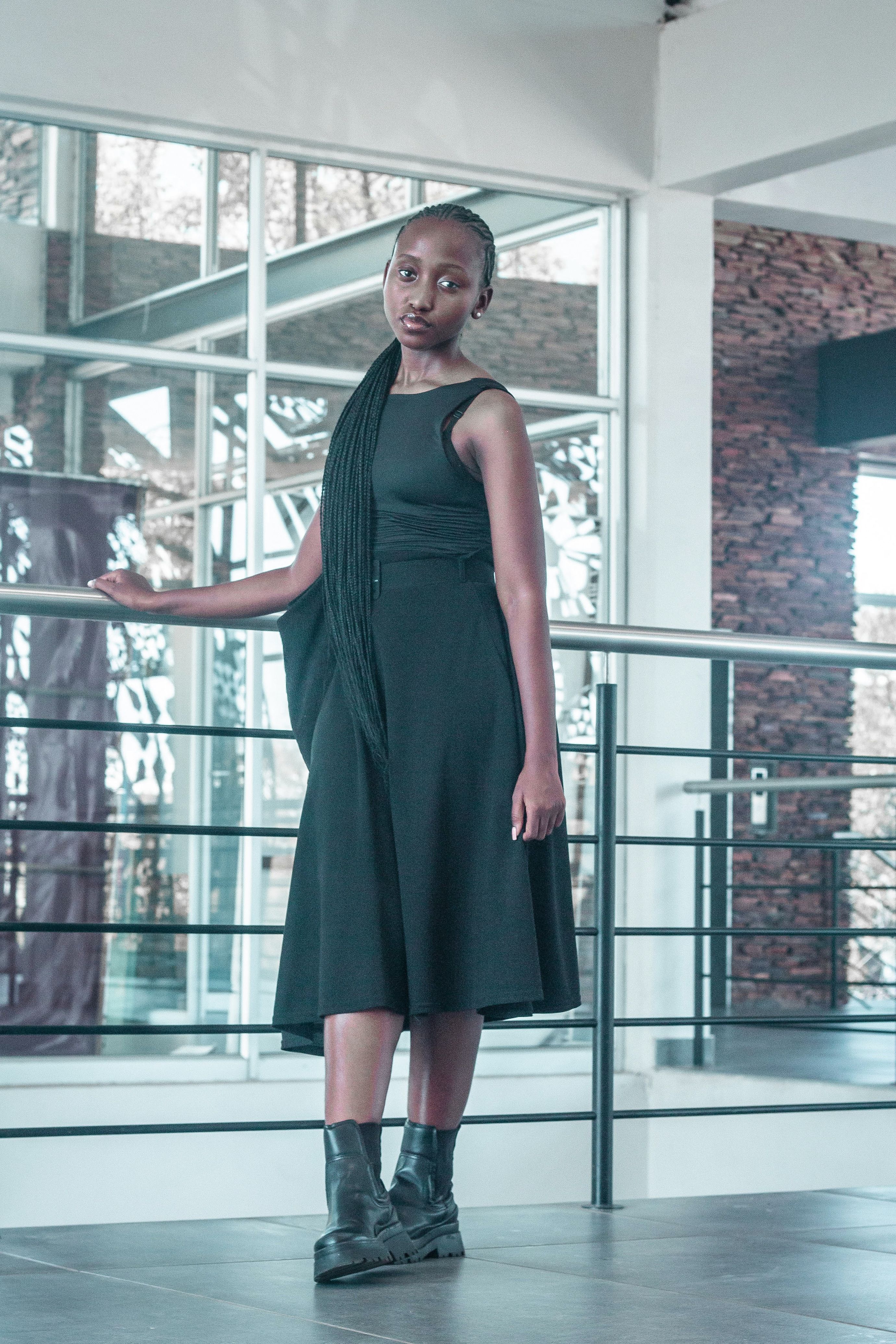 Chic woman in modern indoor setting · Free Stock Photo