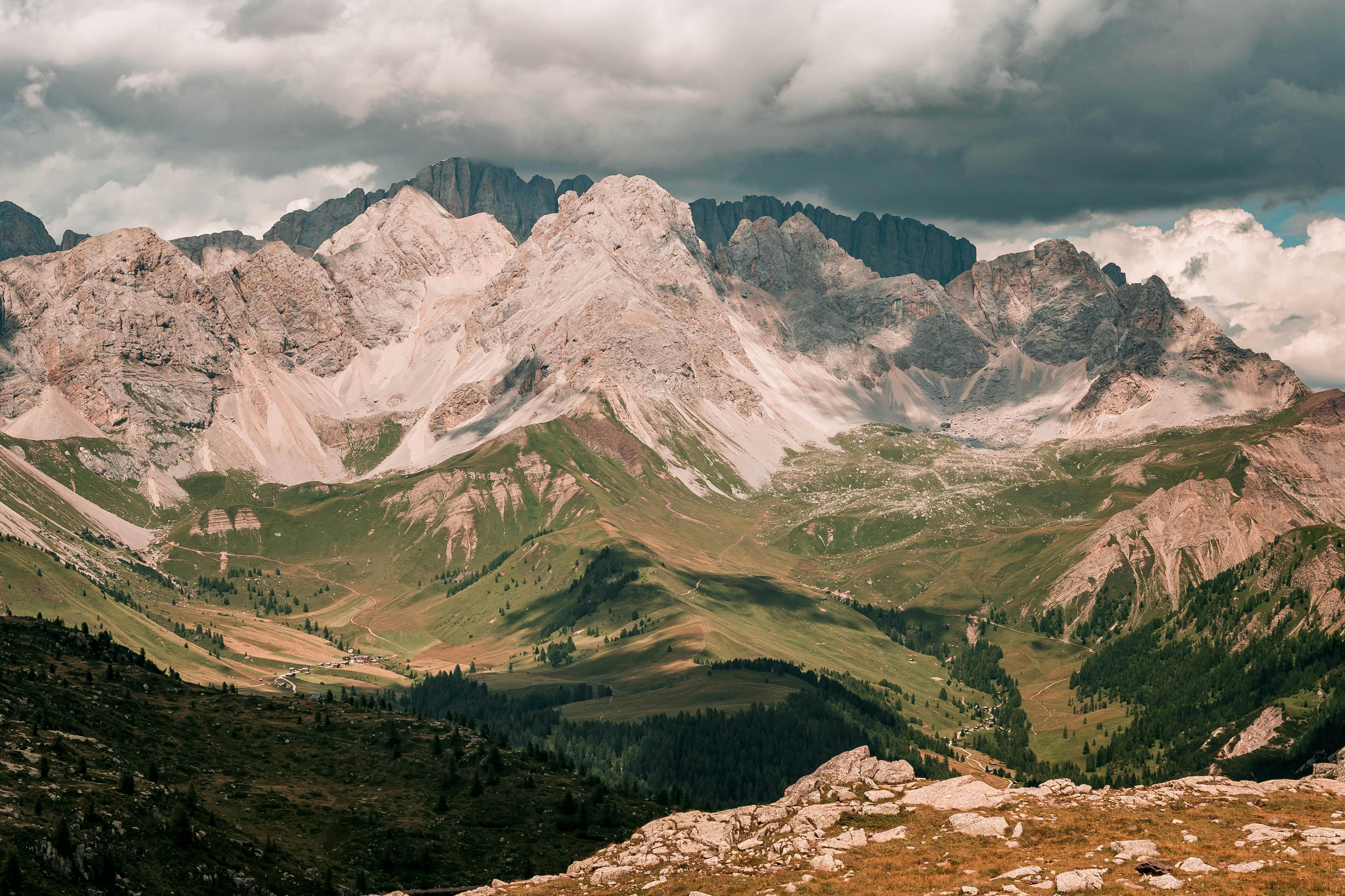 Majestic Mountain Landscape Under Stormy Sky · Free Stock Photo