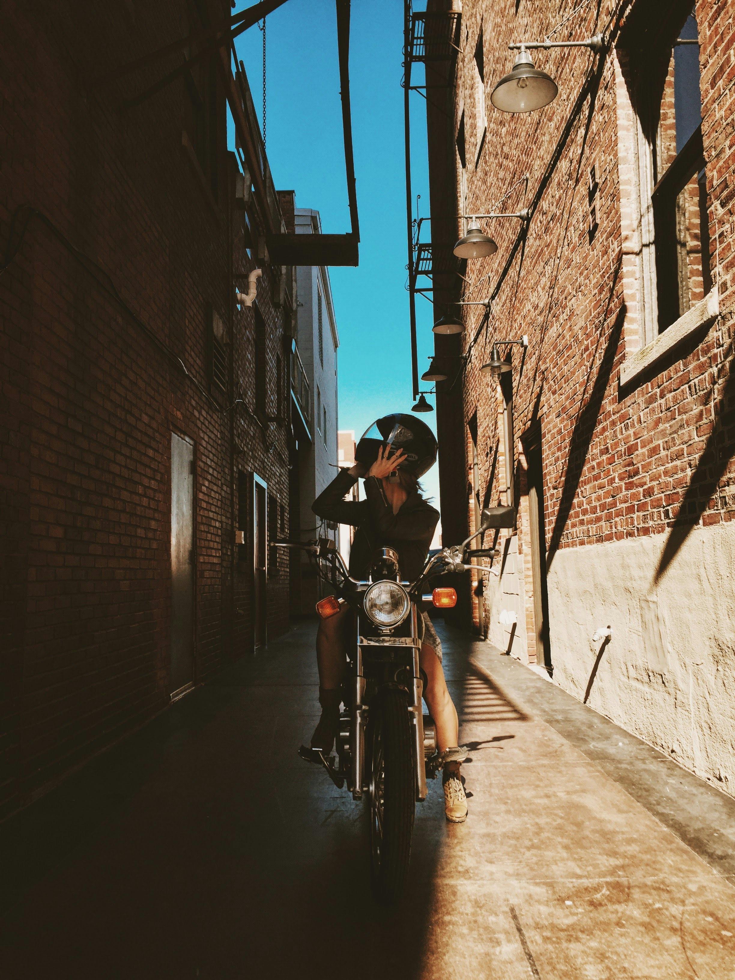 Urban Motorcycle Alleyway Adventure · Free Stock Photo