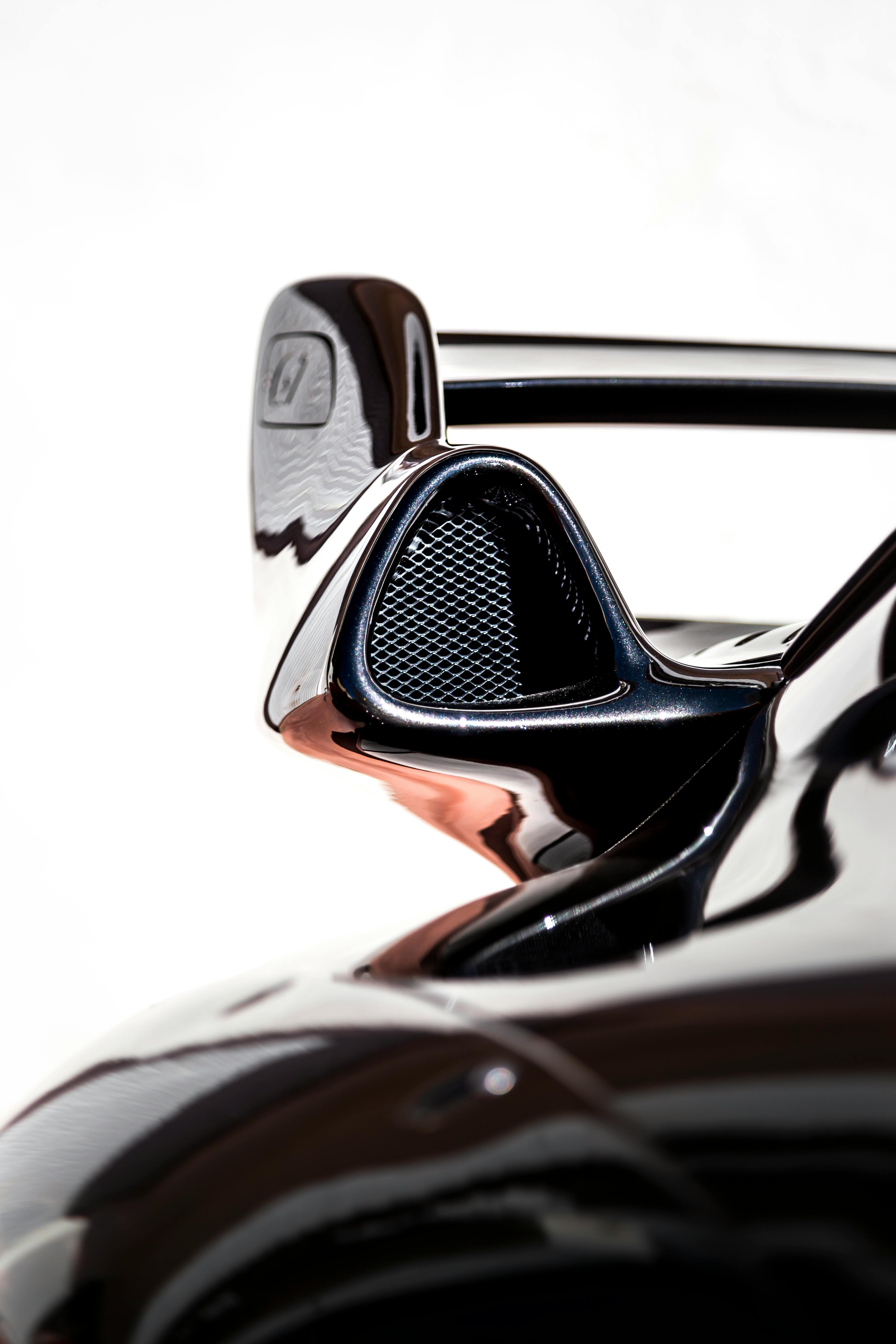 Close-Up of a Black Sports Car Rear Wing · Free Stock Photo