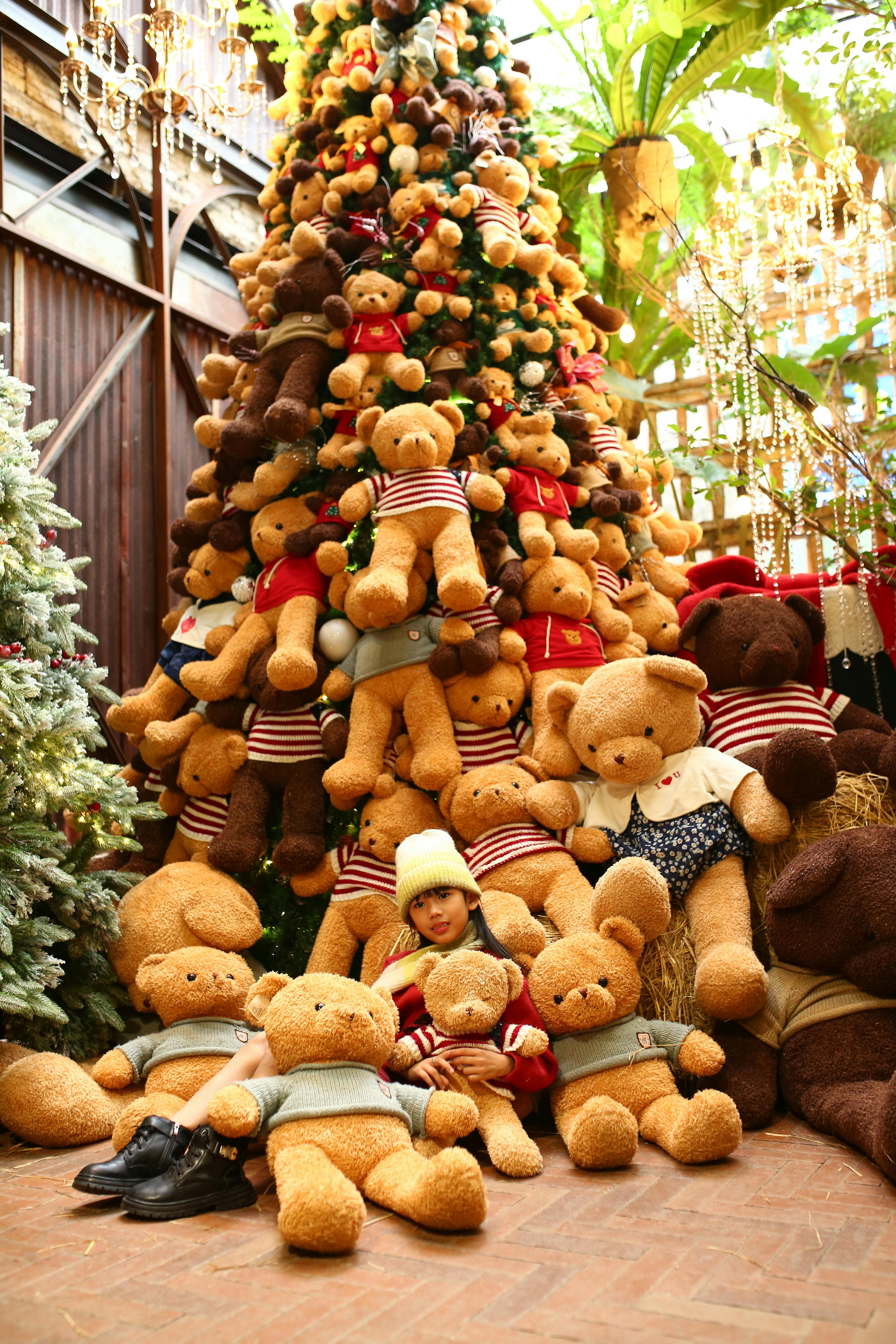Festive Teddy Bear Display with Young Girl in Vietnam · Free Stock Photo