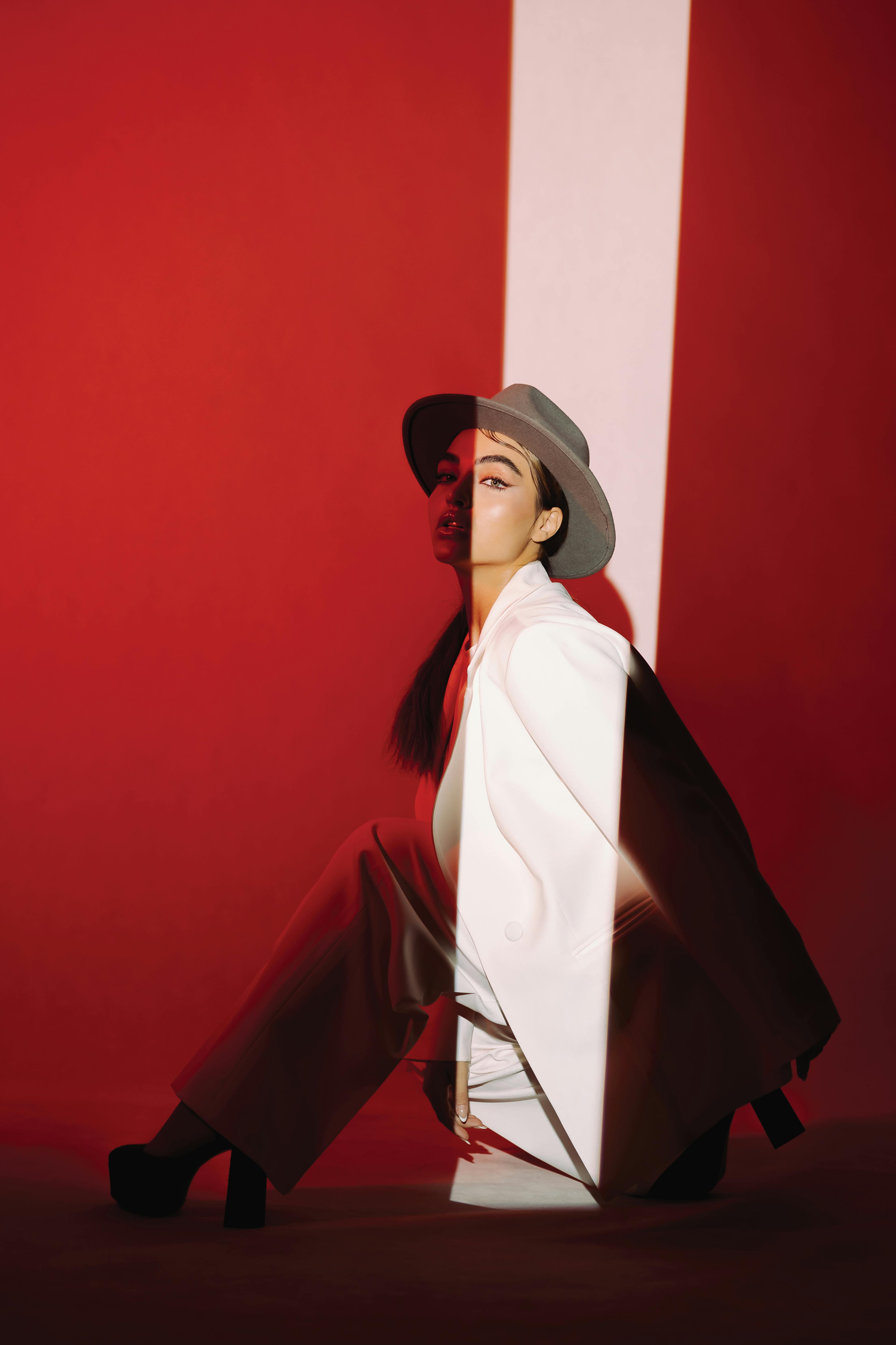 Artistic Fashion Portrait with Red Background · Free Stock Photo