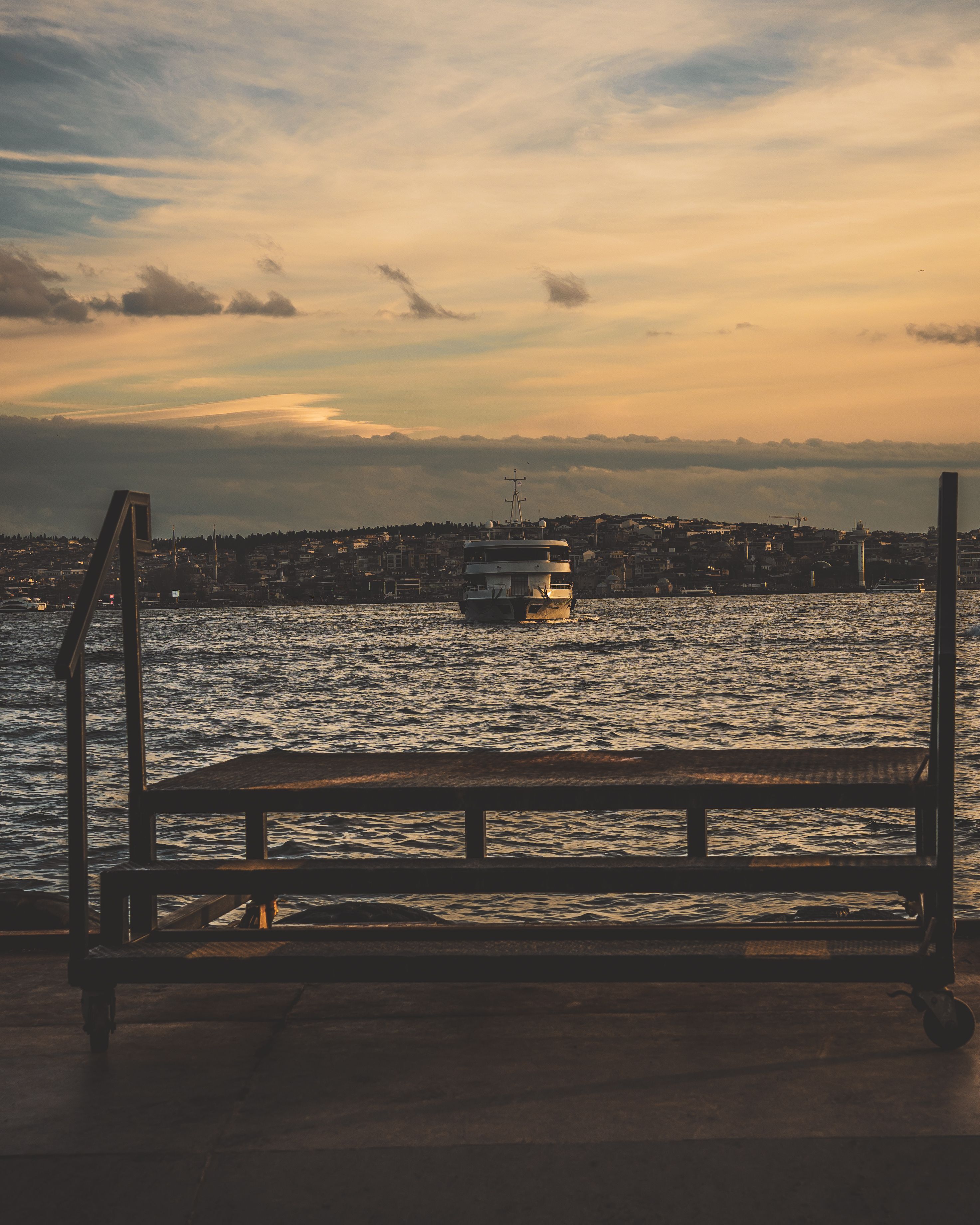 Sunset View of Urban Waterfront with Dock · Free Stock Photo