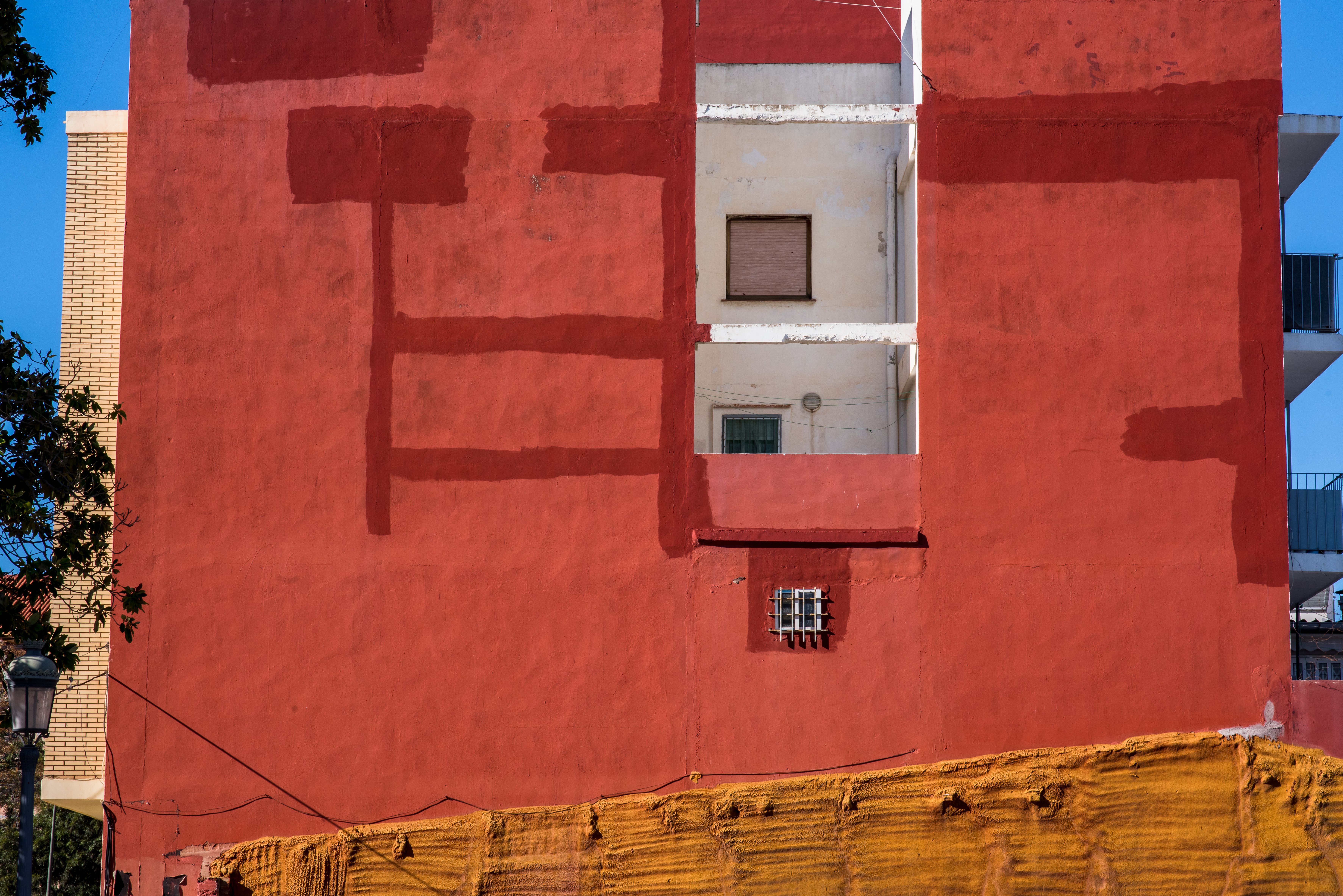 Red Urban Wall with Window Abstract View · Free Stock Photo