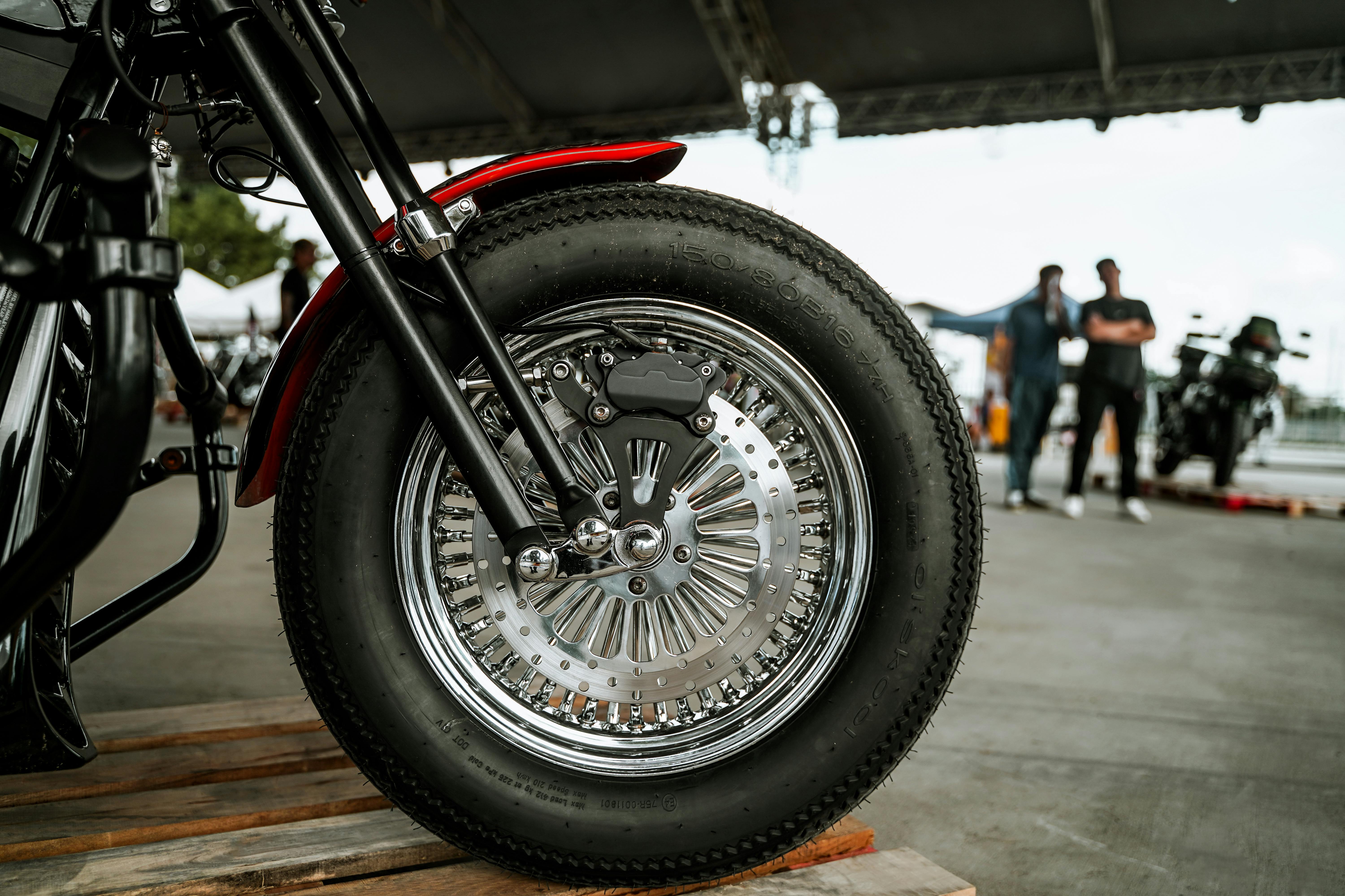 Close-up of Motorcycle Wheel in Quezon City Event · Free Stock Photo
