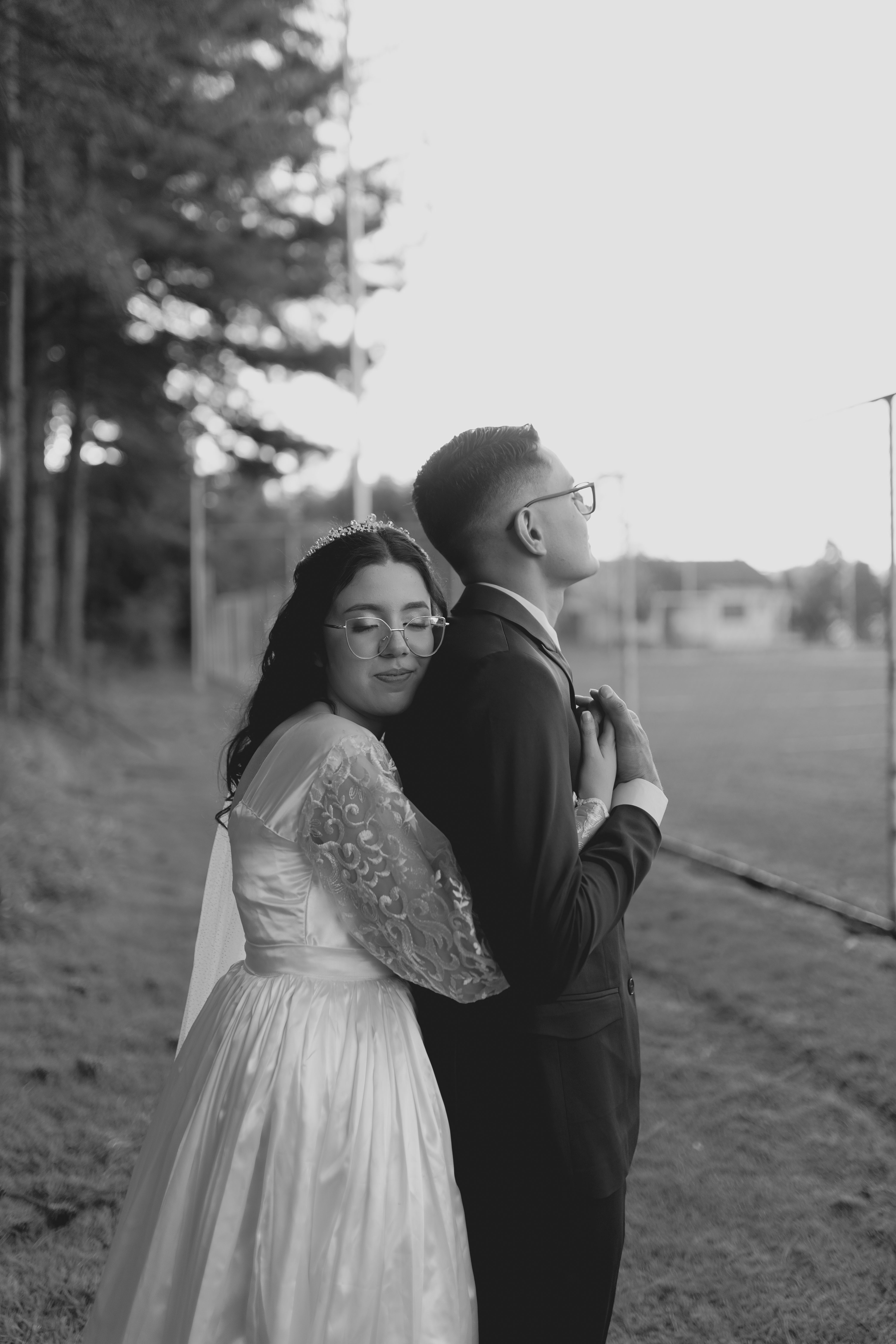 Intimate black and white wedding portrait outdoors · Free Stock Photo