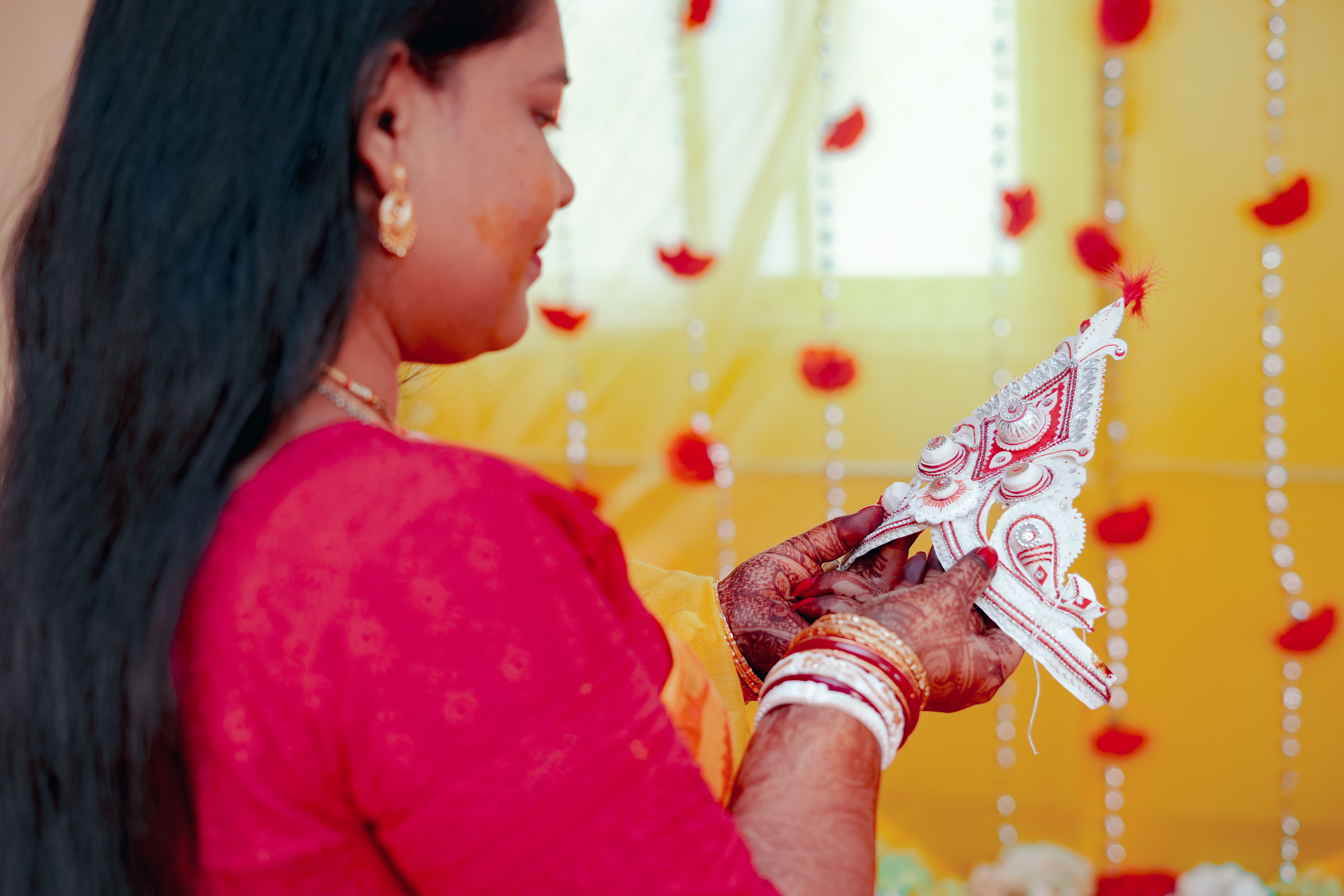 Bengali Bride Holding Traditional Mukut in Ceremony · Free Stock Photo